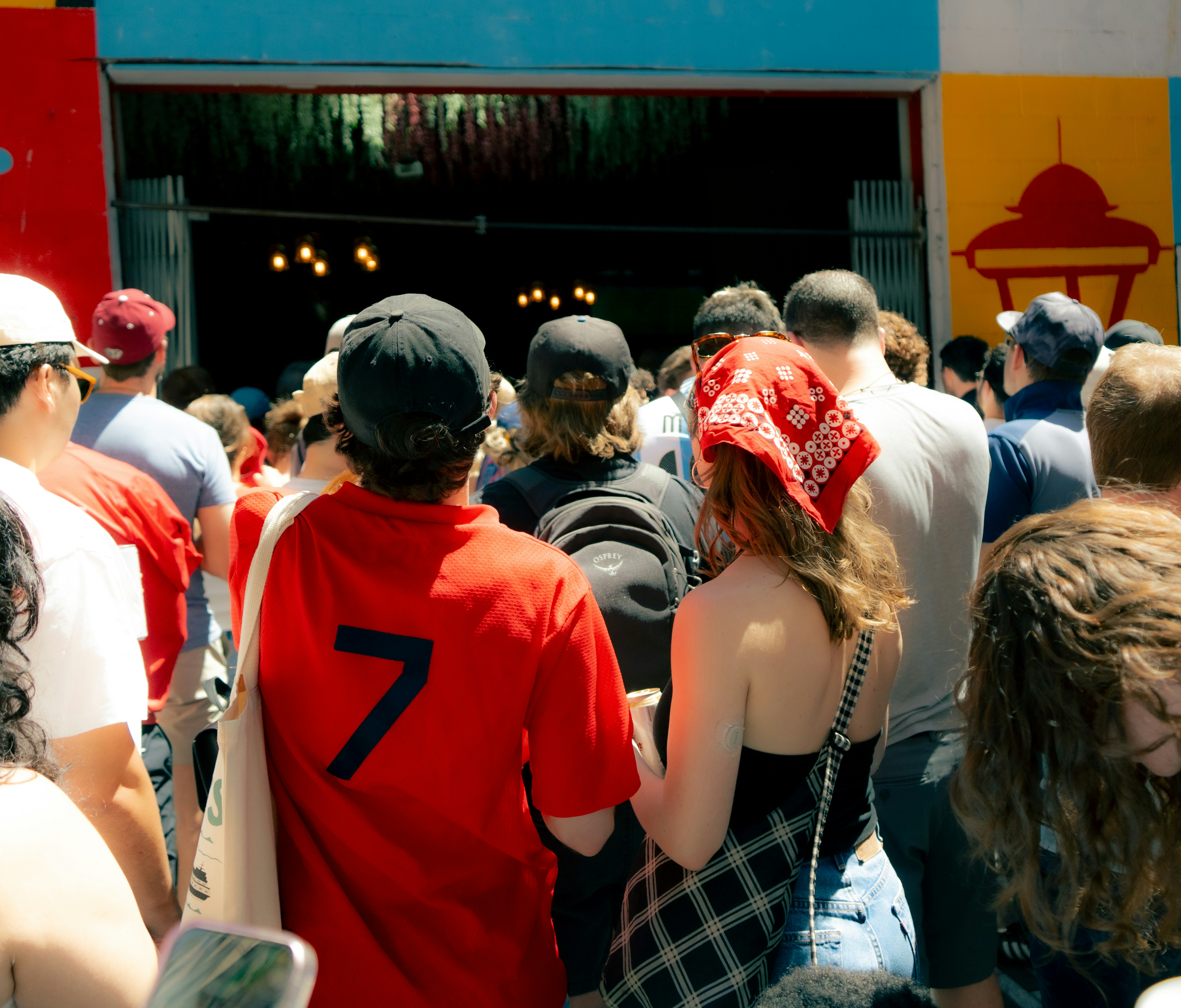 Bandana and Red Jersey: A Moment at the Entrance