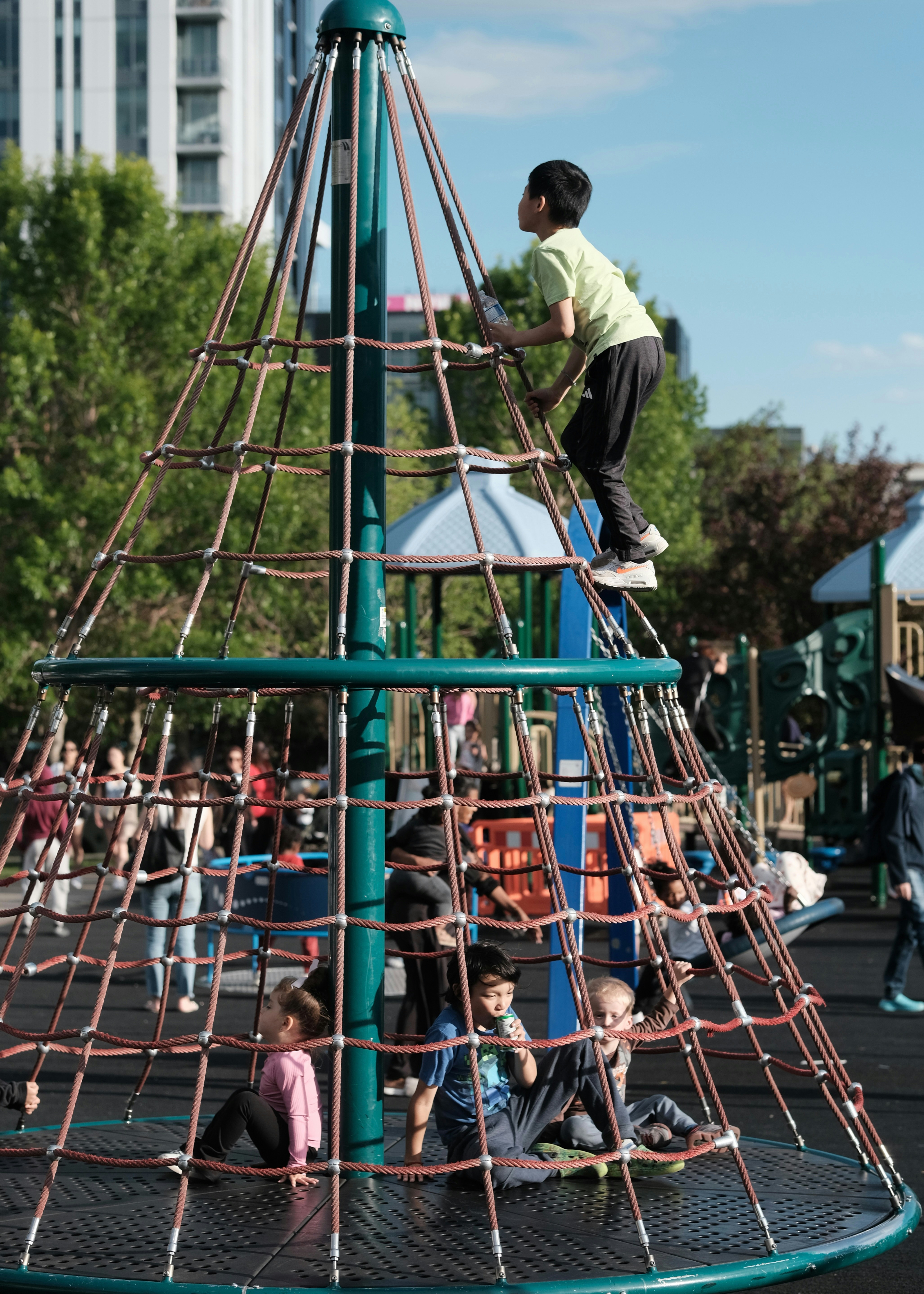 Child at the Peak: Climber on a Rope Cone