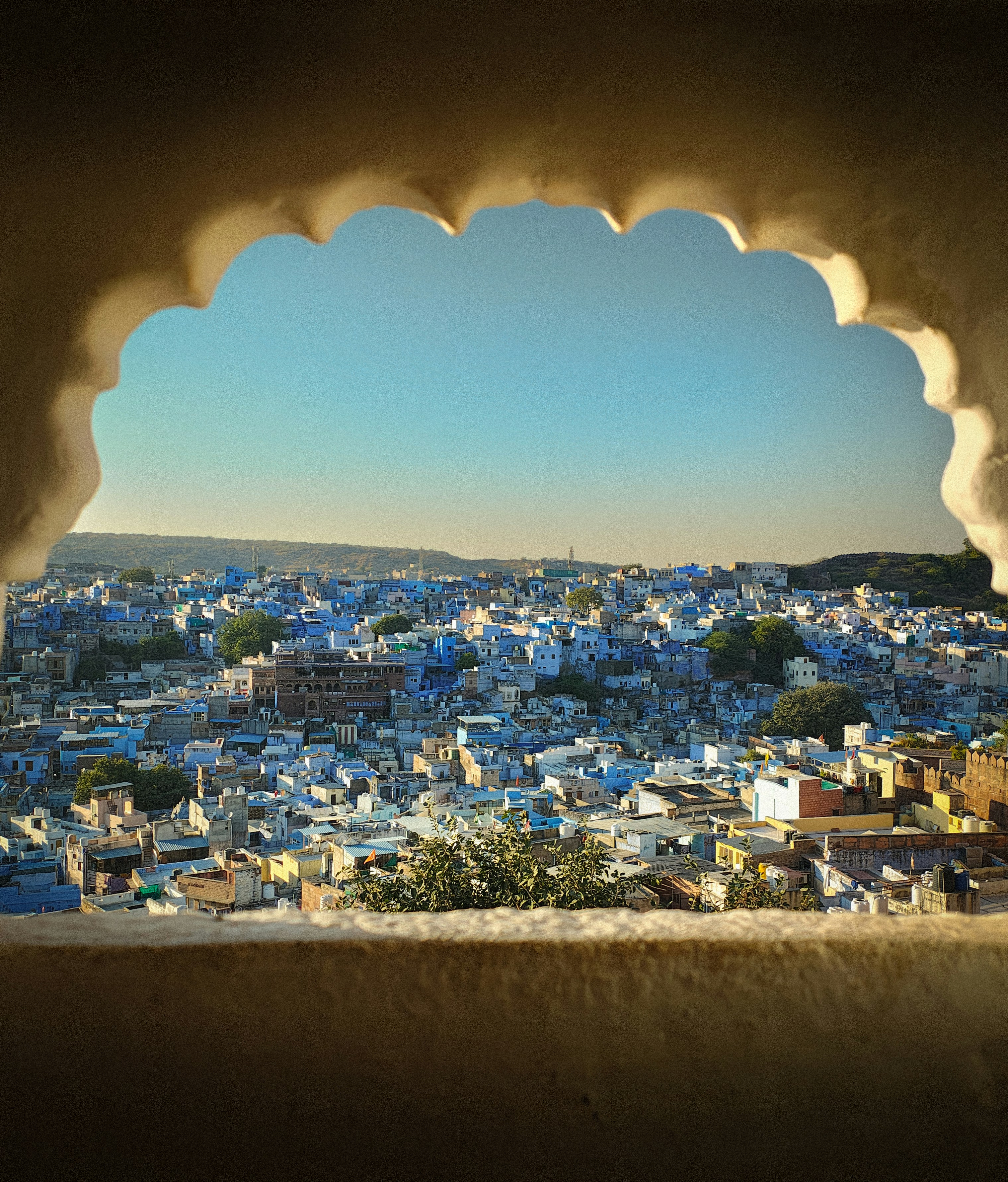 Blue City Vista Framed by an Archway