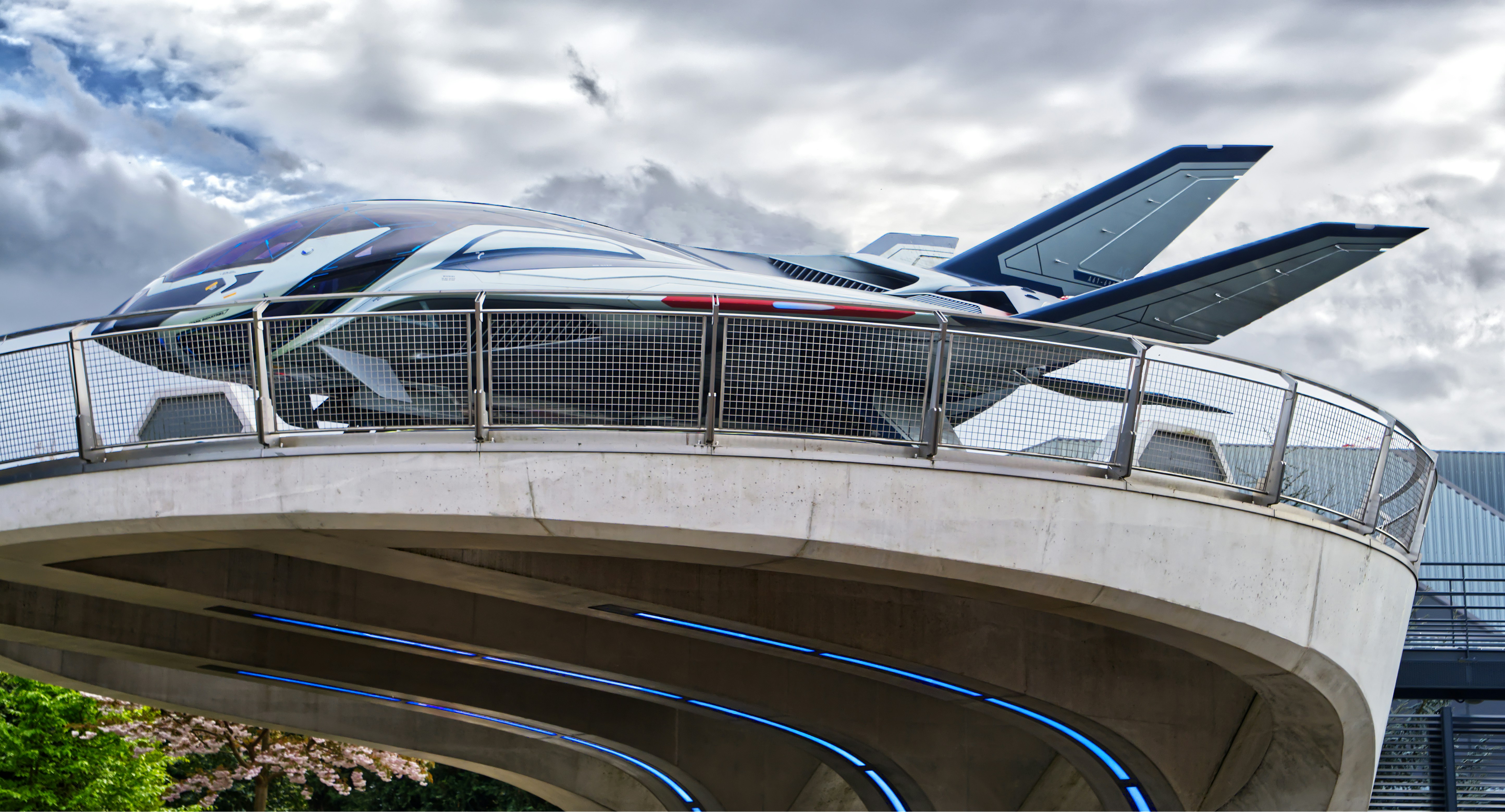 High-speed sierra: a private jet glides along a curved elevated track