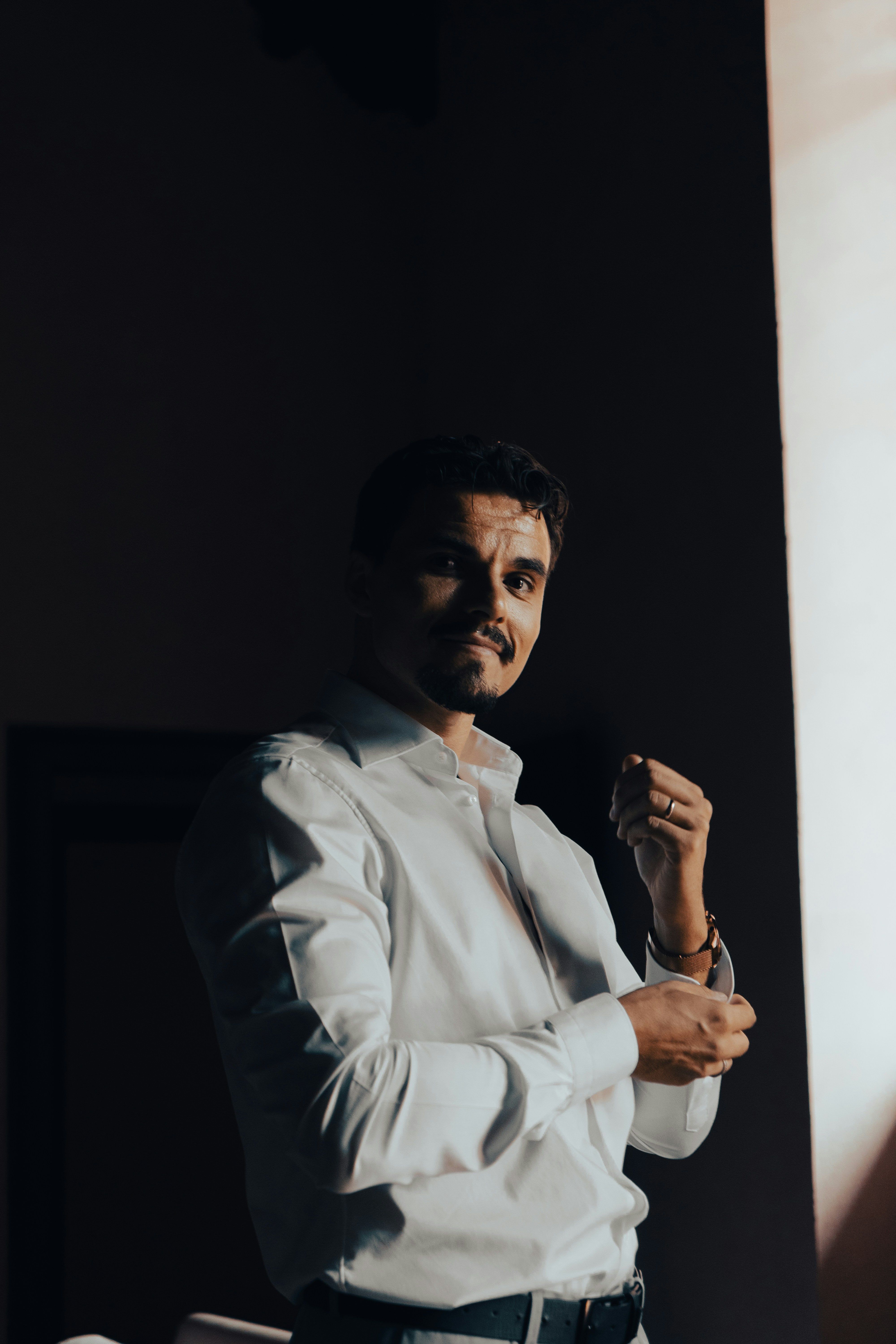 Void of Light, Edge of Focus: A Confident Portrait in Soft Backdrop