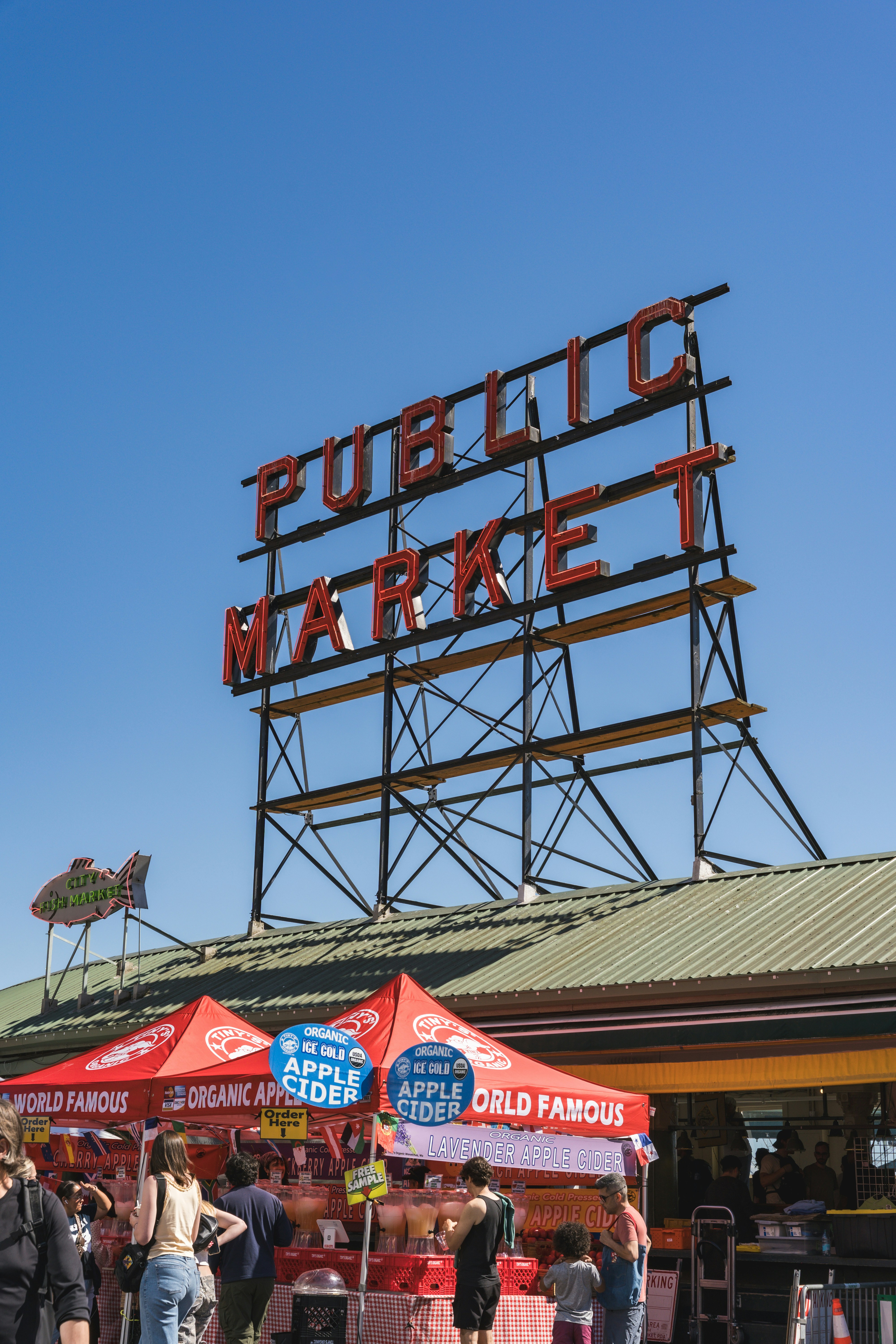 Public Market Signage Under a Clear Blue Sky
