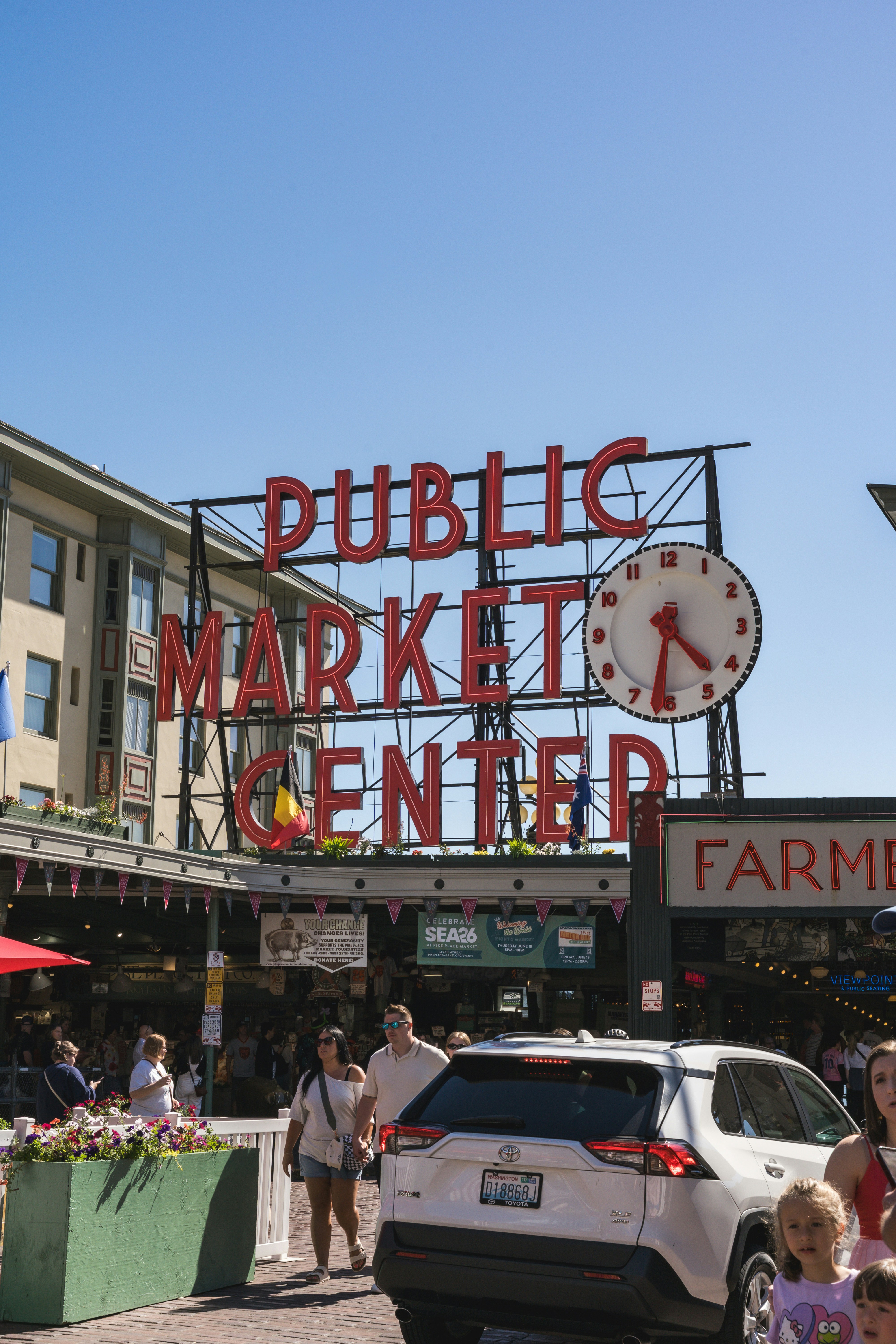 Public Market Sign in a Sunlit Downtown Scene
