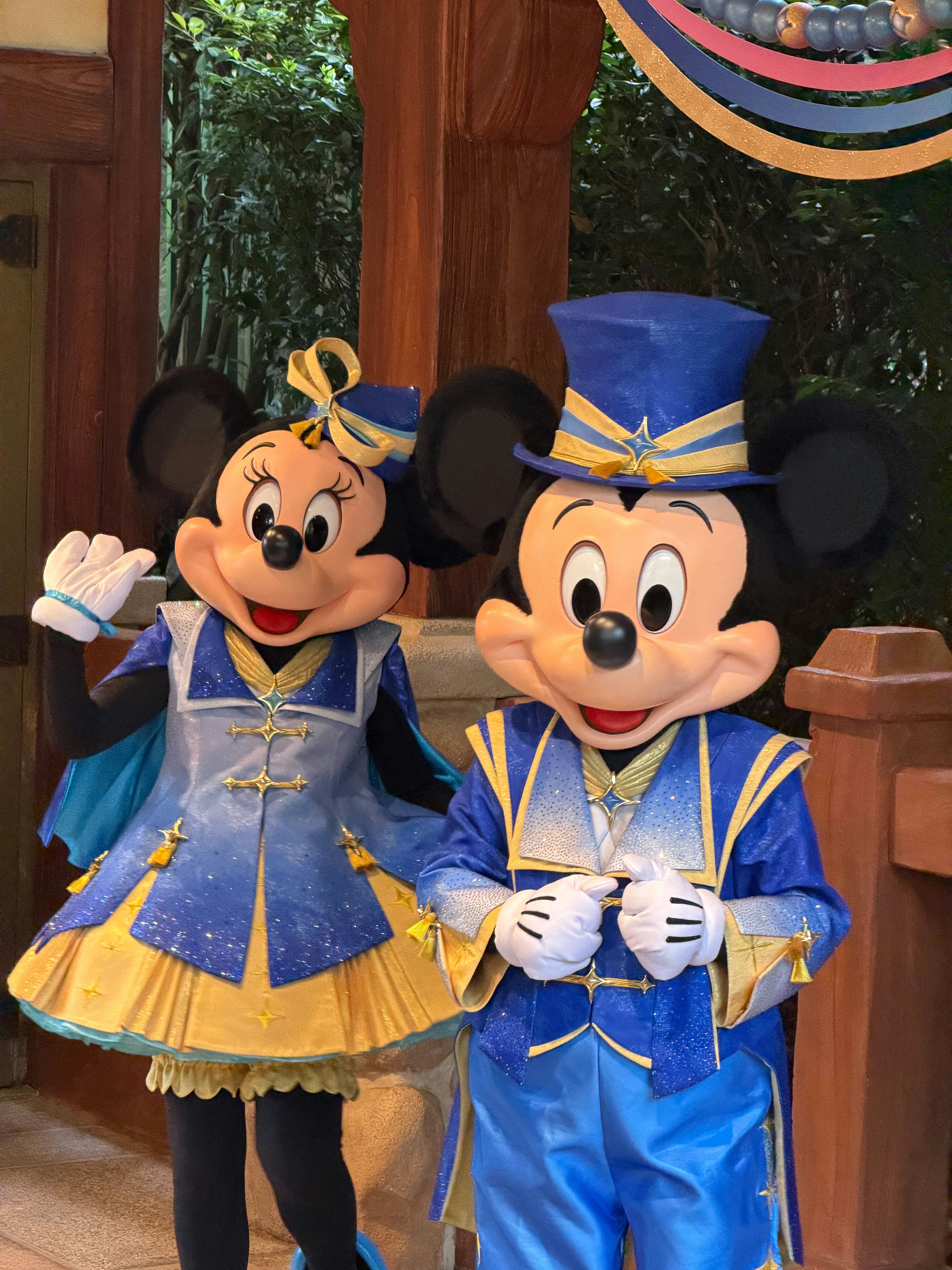 Magical duo: Mickey and Minnie in shimmering blue stage outfits
