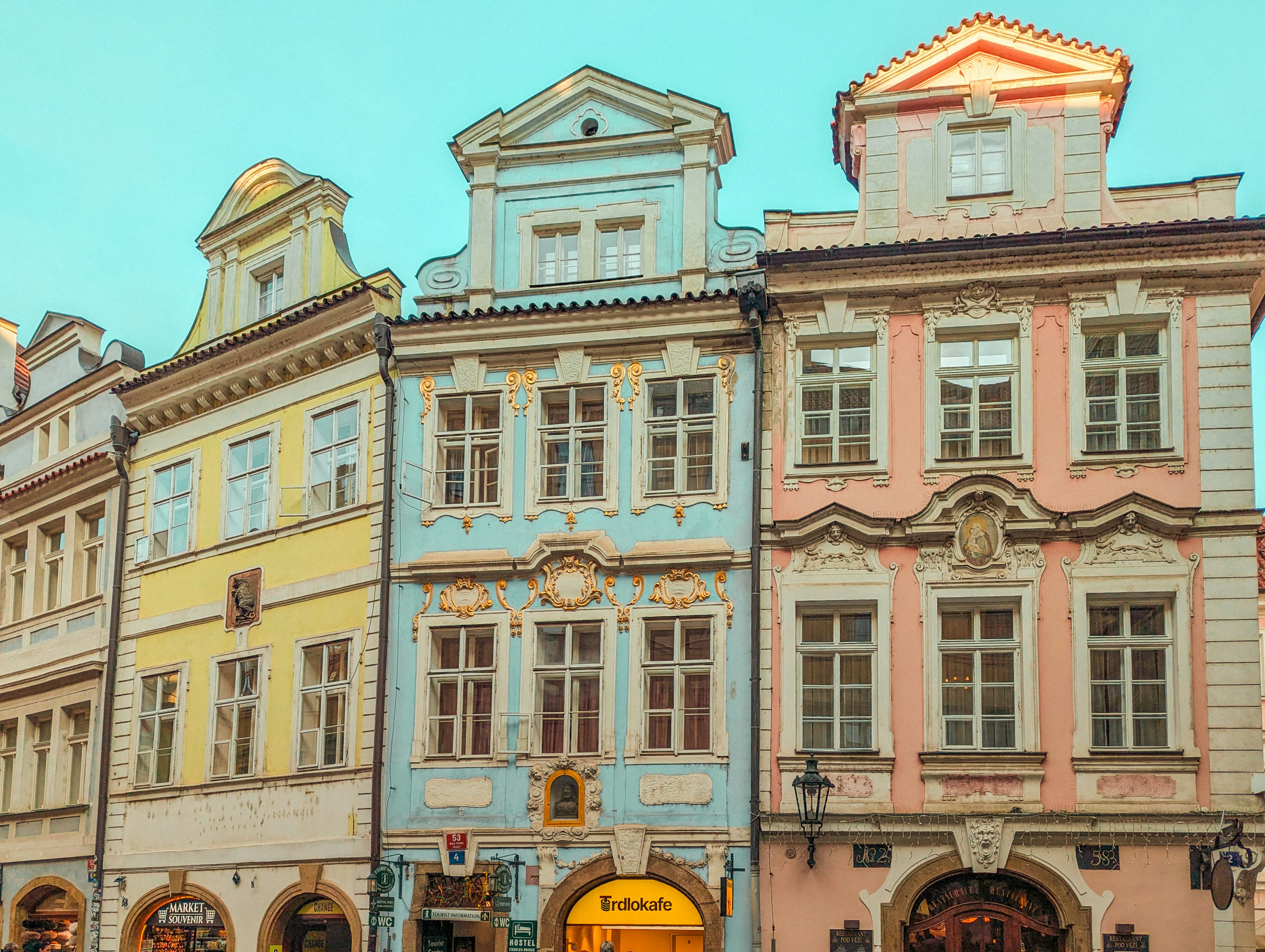 Pastel Facades of a Cobblestone Row