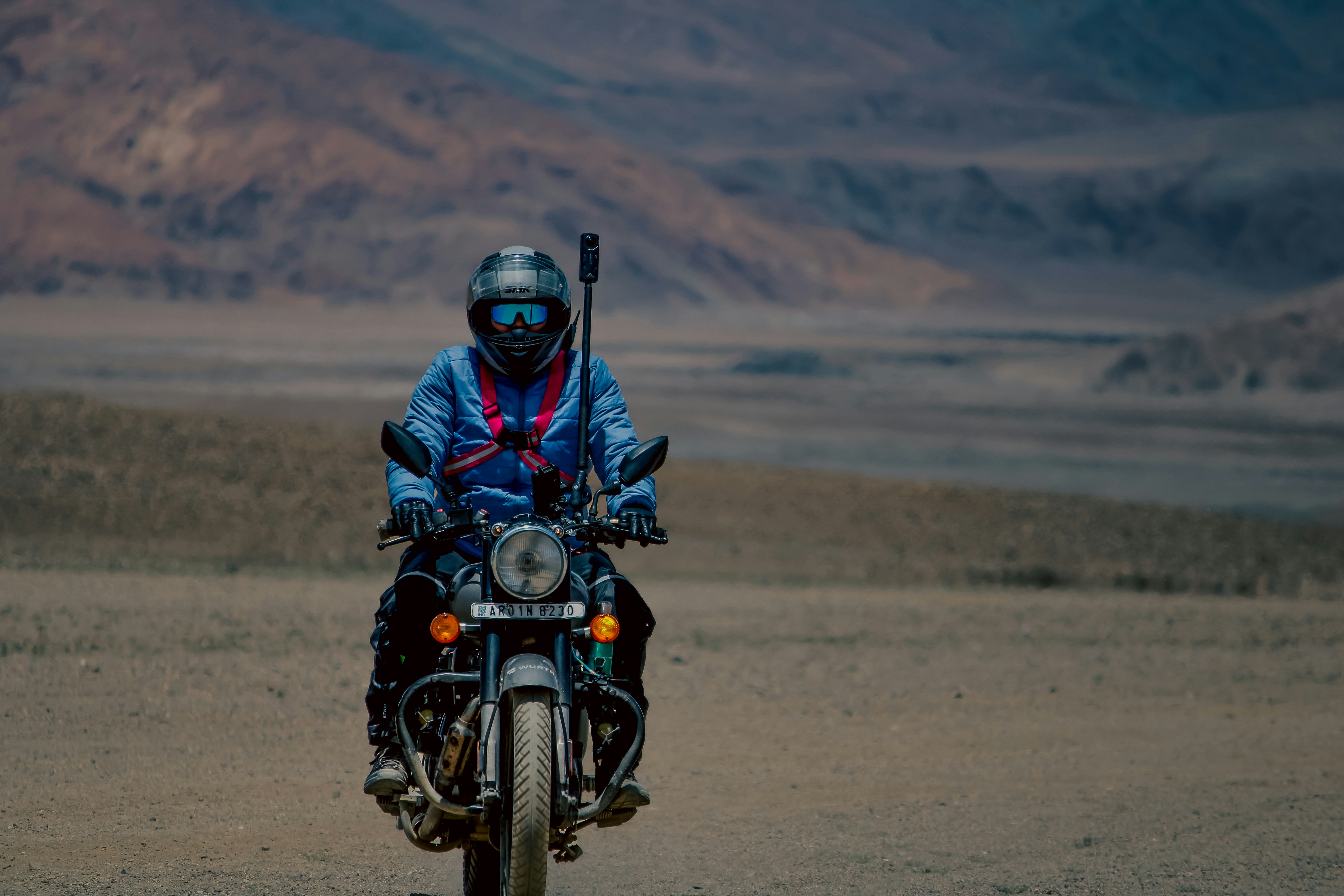 Frontline Traveler: Rider in a Windswept Basin