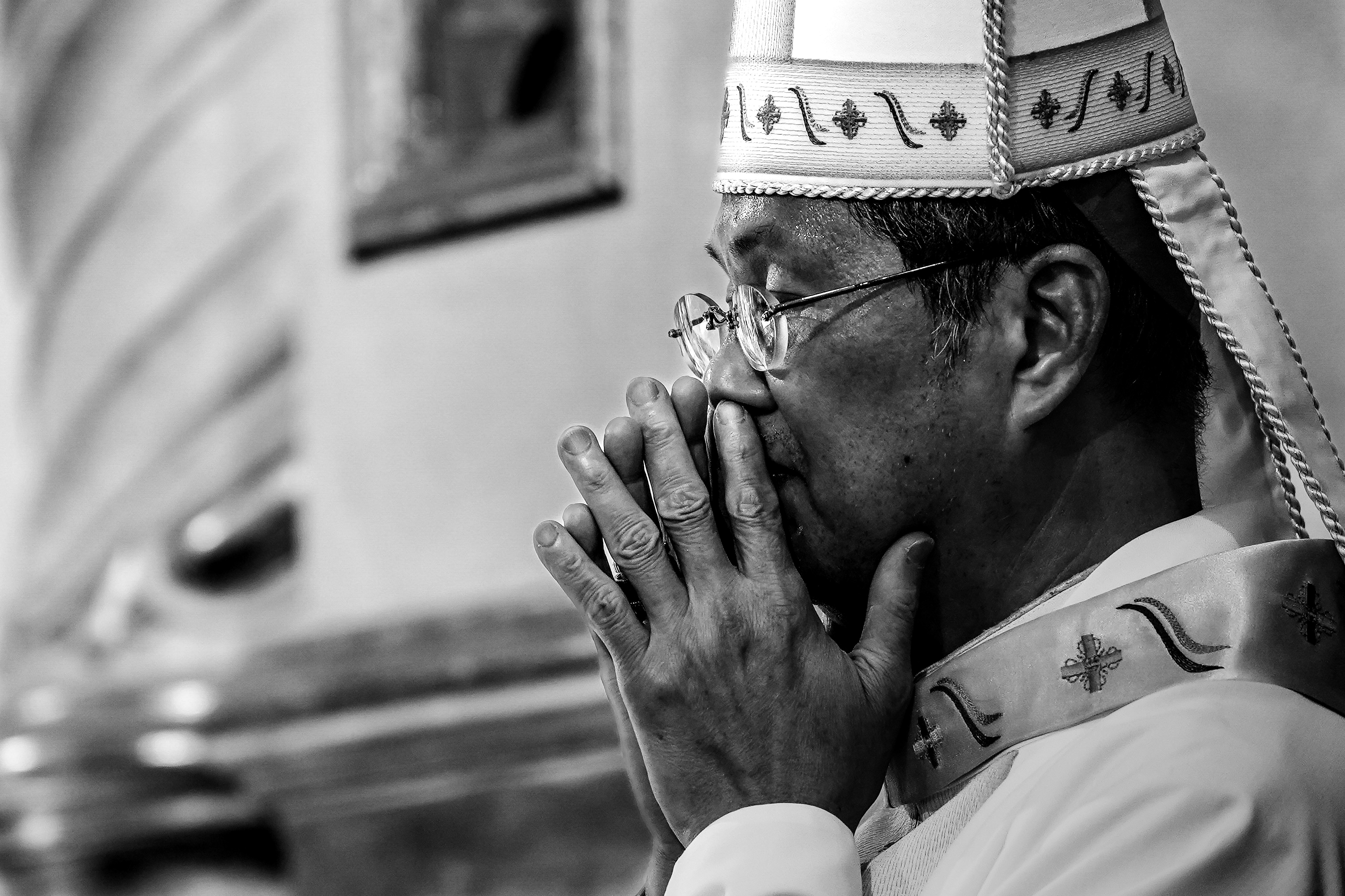 Veiled Prayer: A Cleric in Quiet Contemplation