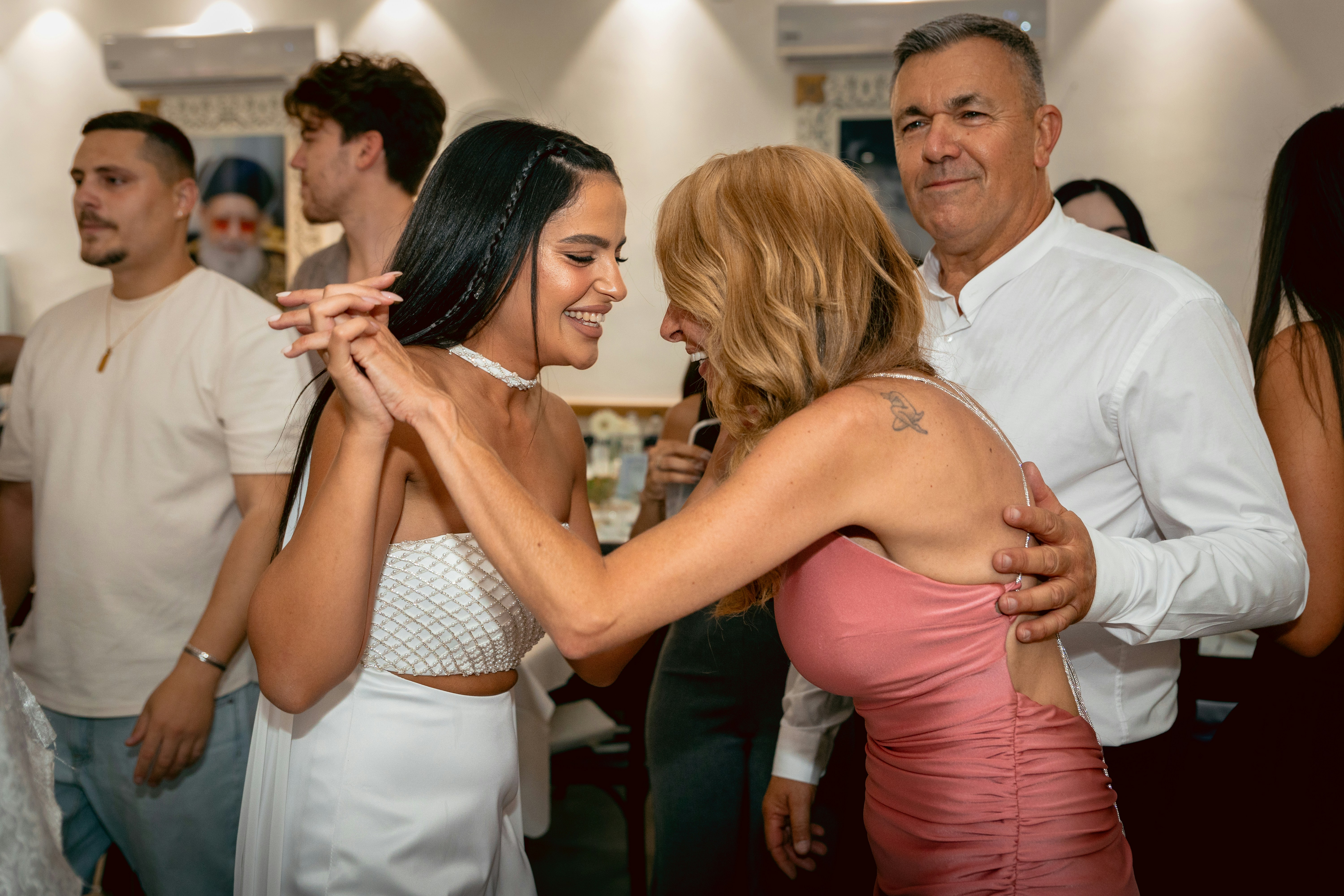Duo Dance: A Close Embrace at a Festive Gathering