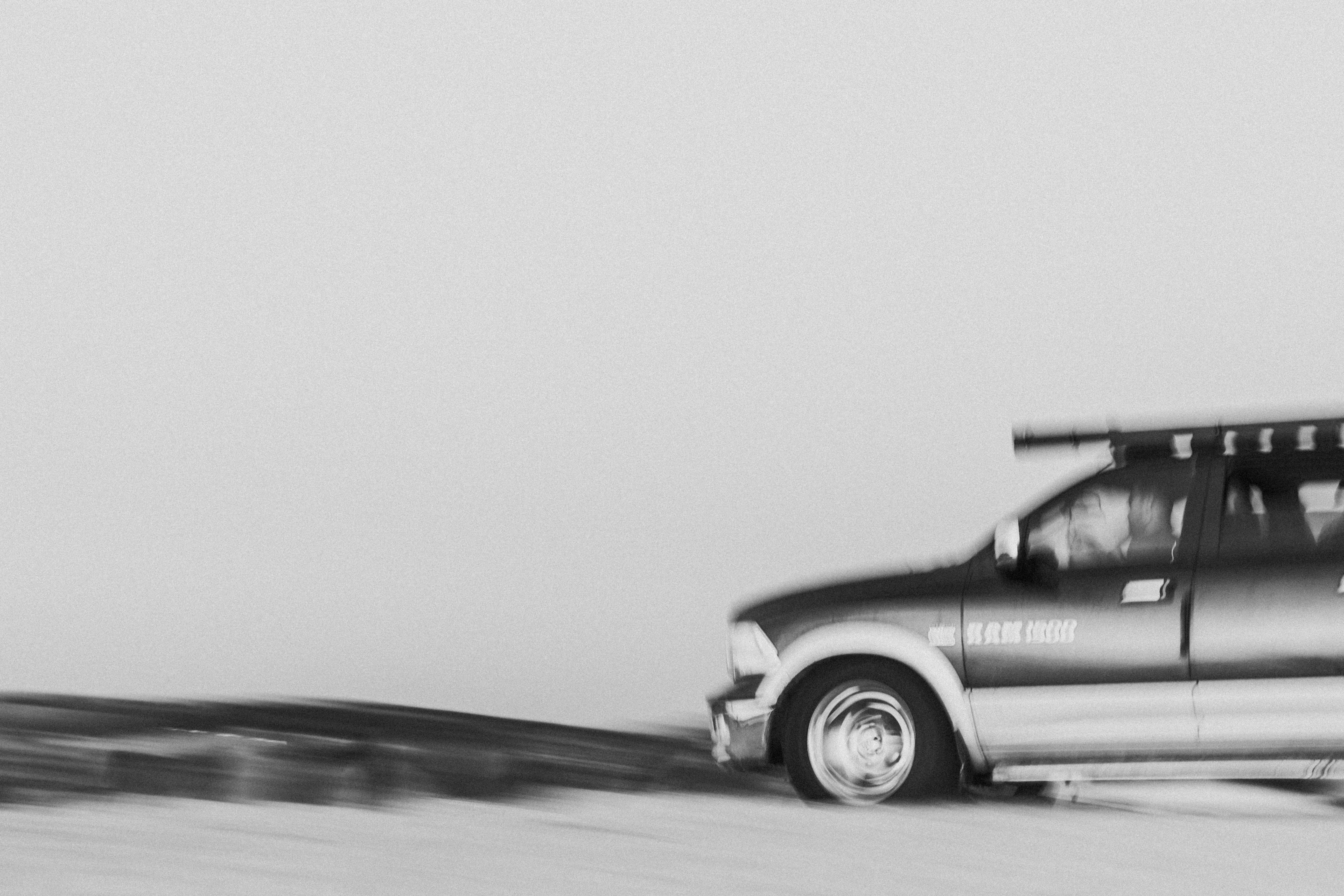 Humming Pickup in Motion: Desert Road Blur