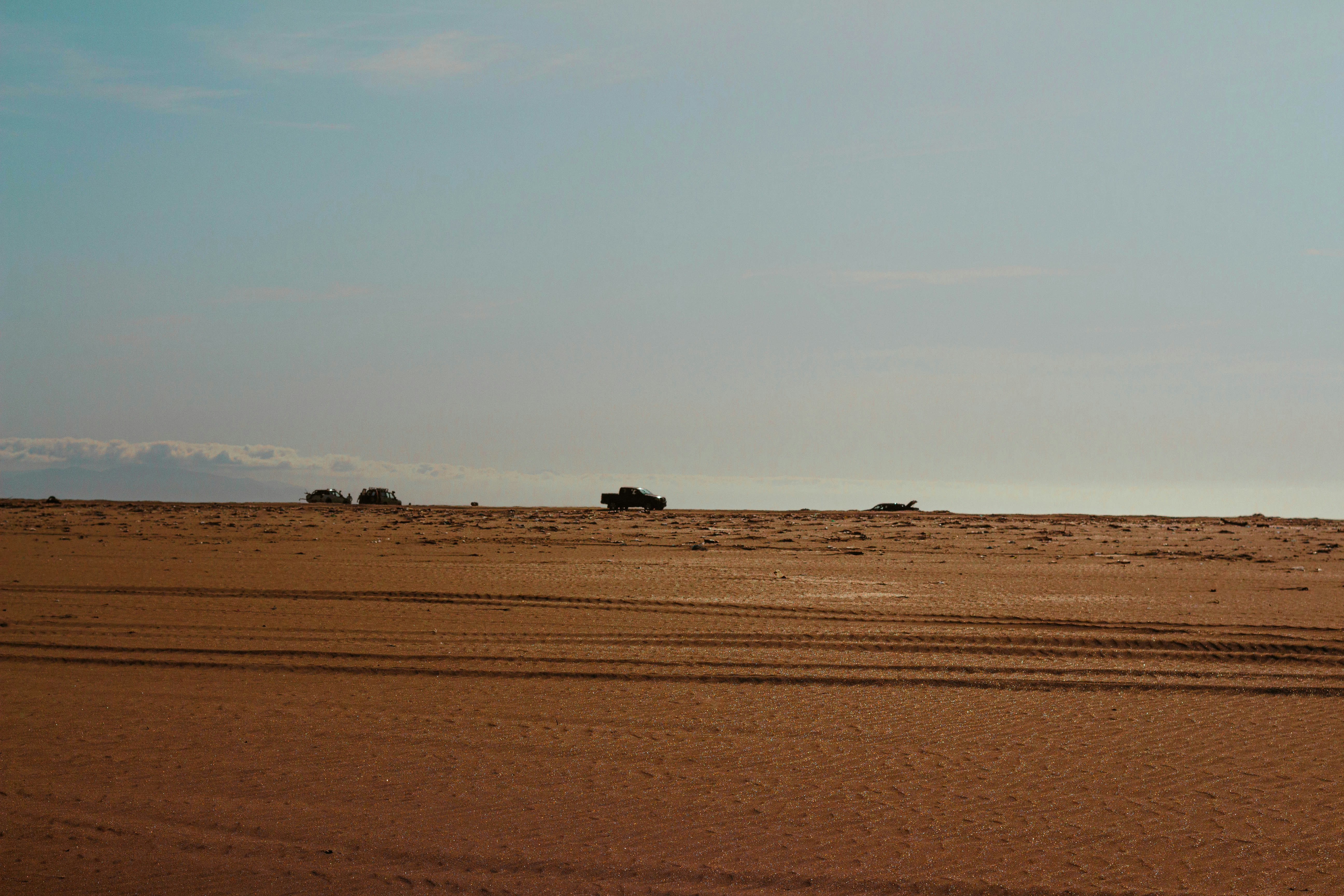 Low Horizon, Distant Dunes: A Quiet Coastal Plain Under Soft Evening Light