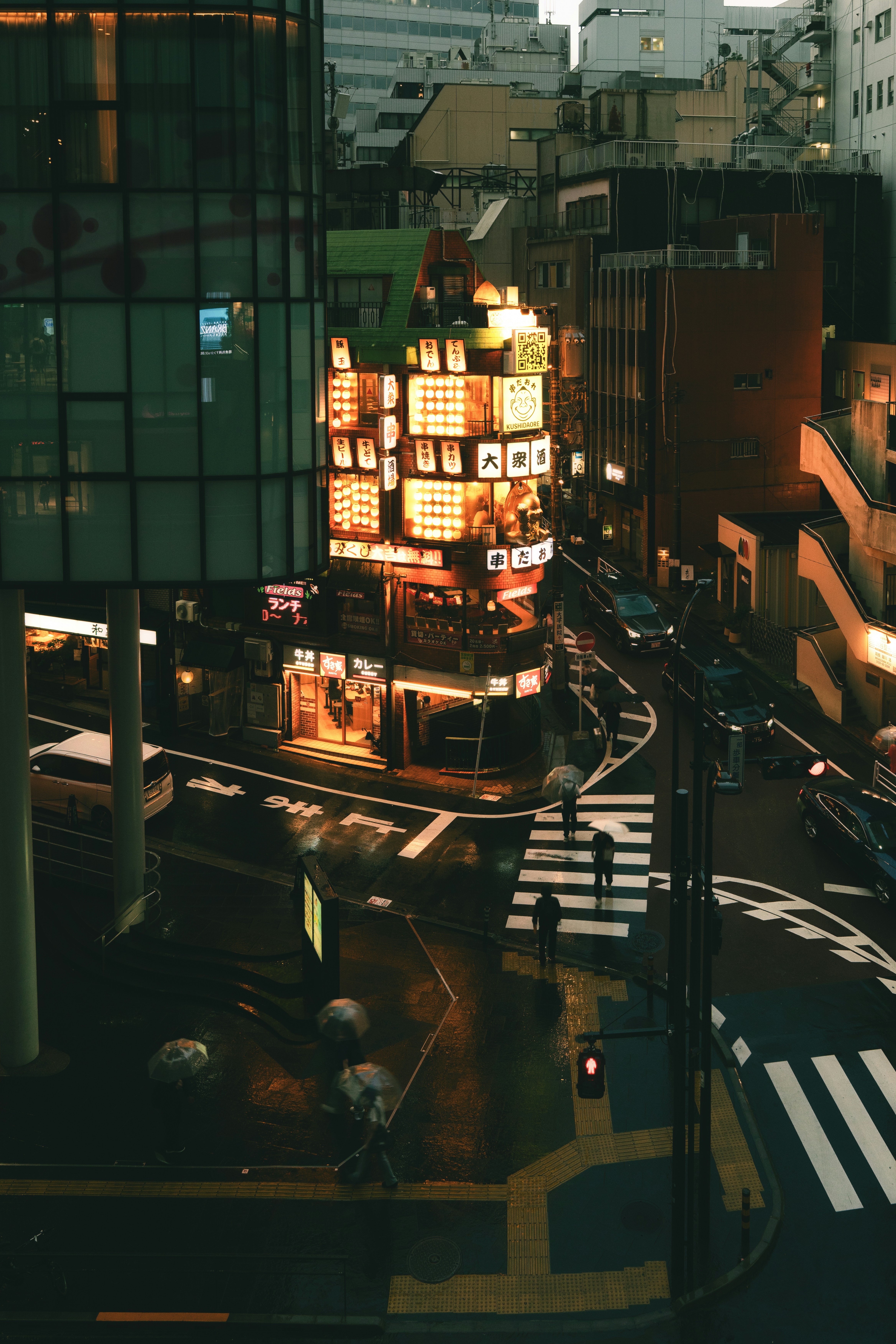 Neon Corner: A Rainy Crossroads in Tokyo