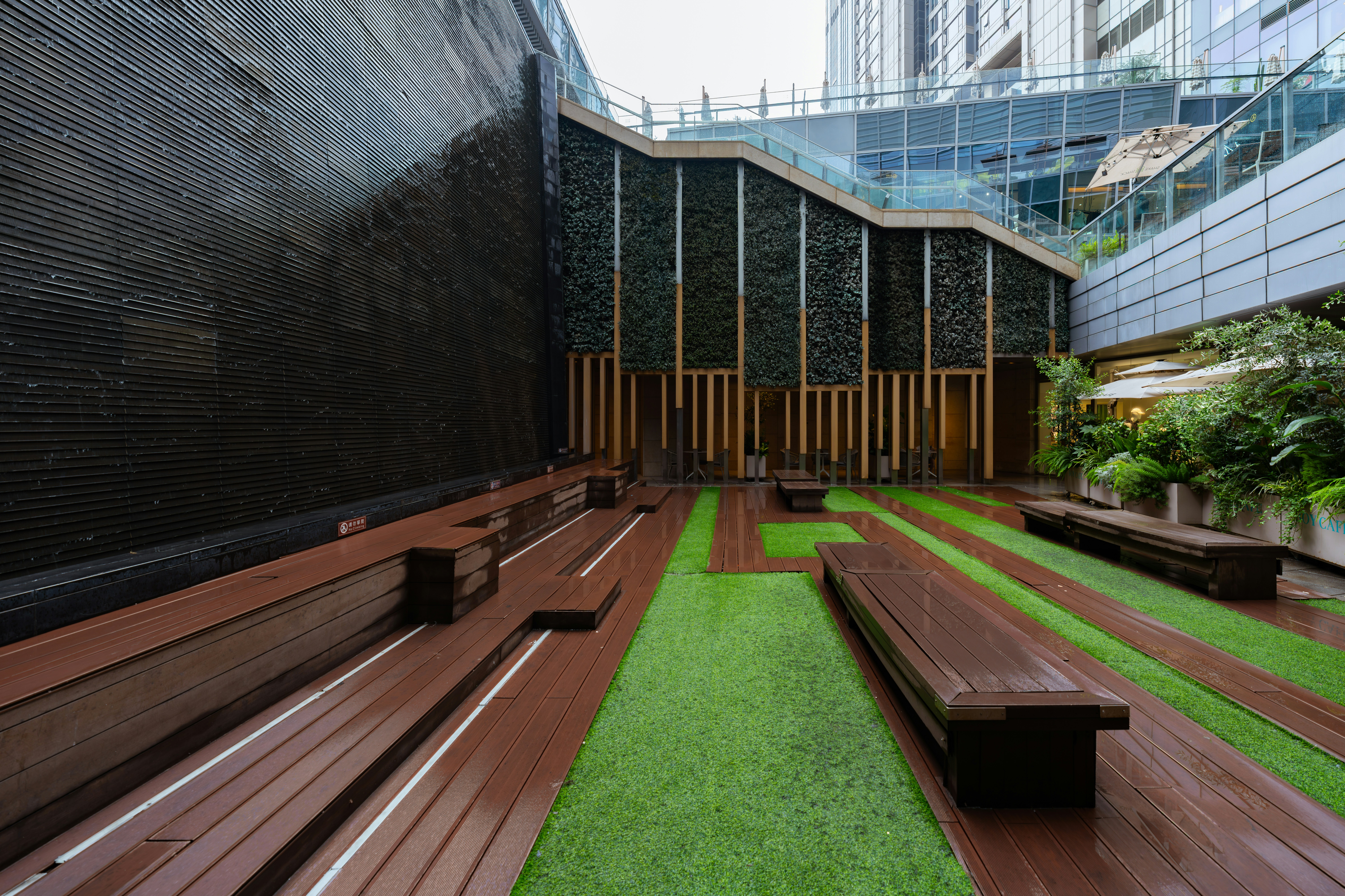 Urban Oasis: Quiet Seating Beneath a Cedar-Panel Sky