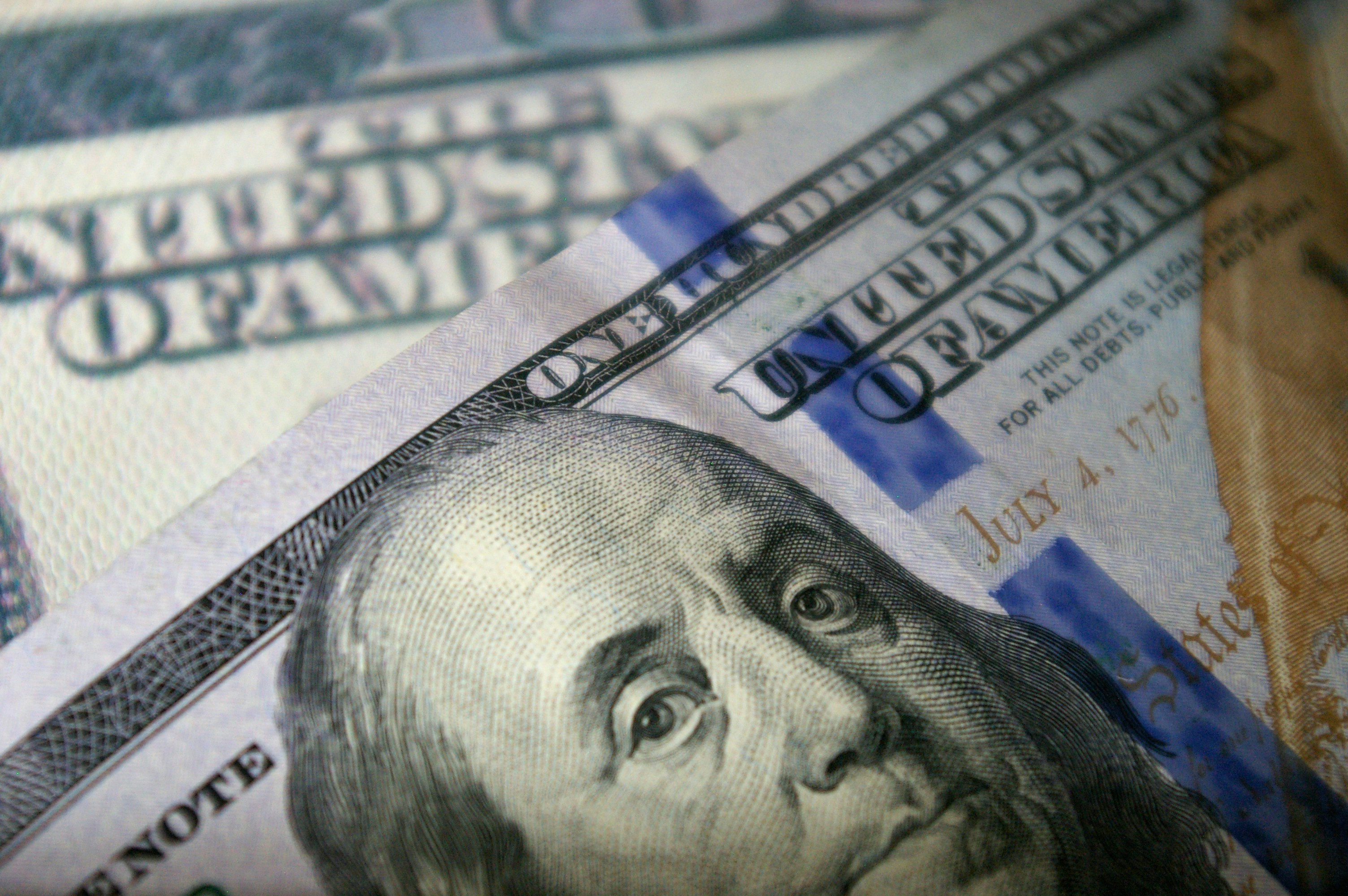 Hidden Ledger: A Folded Portrait on Dollar Lines