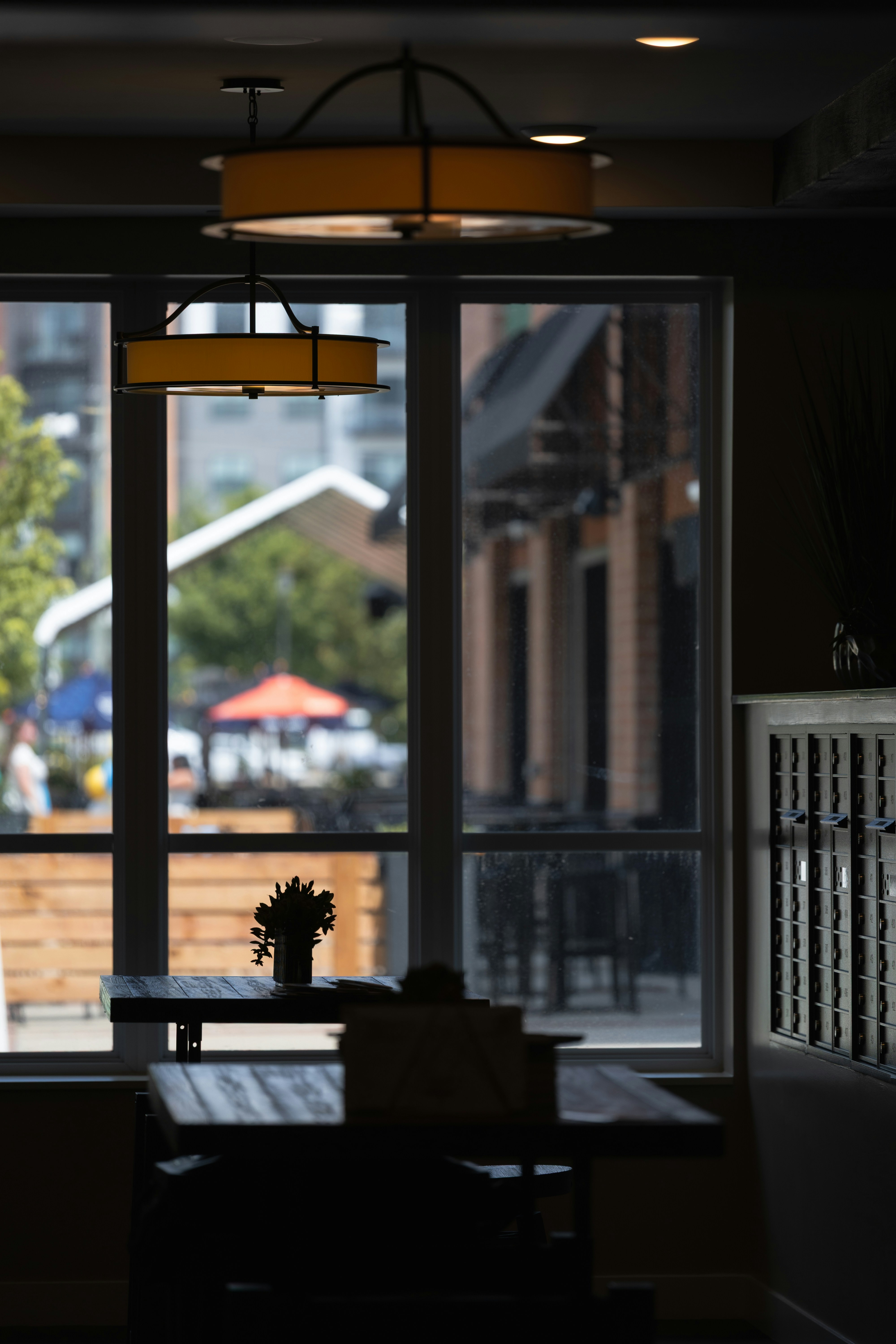 Sunlit Café Through a Quiet Window