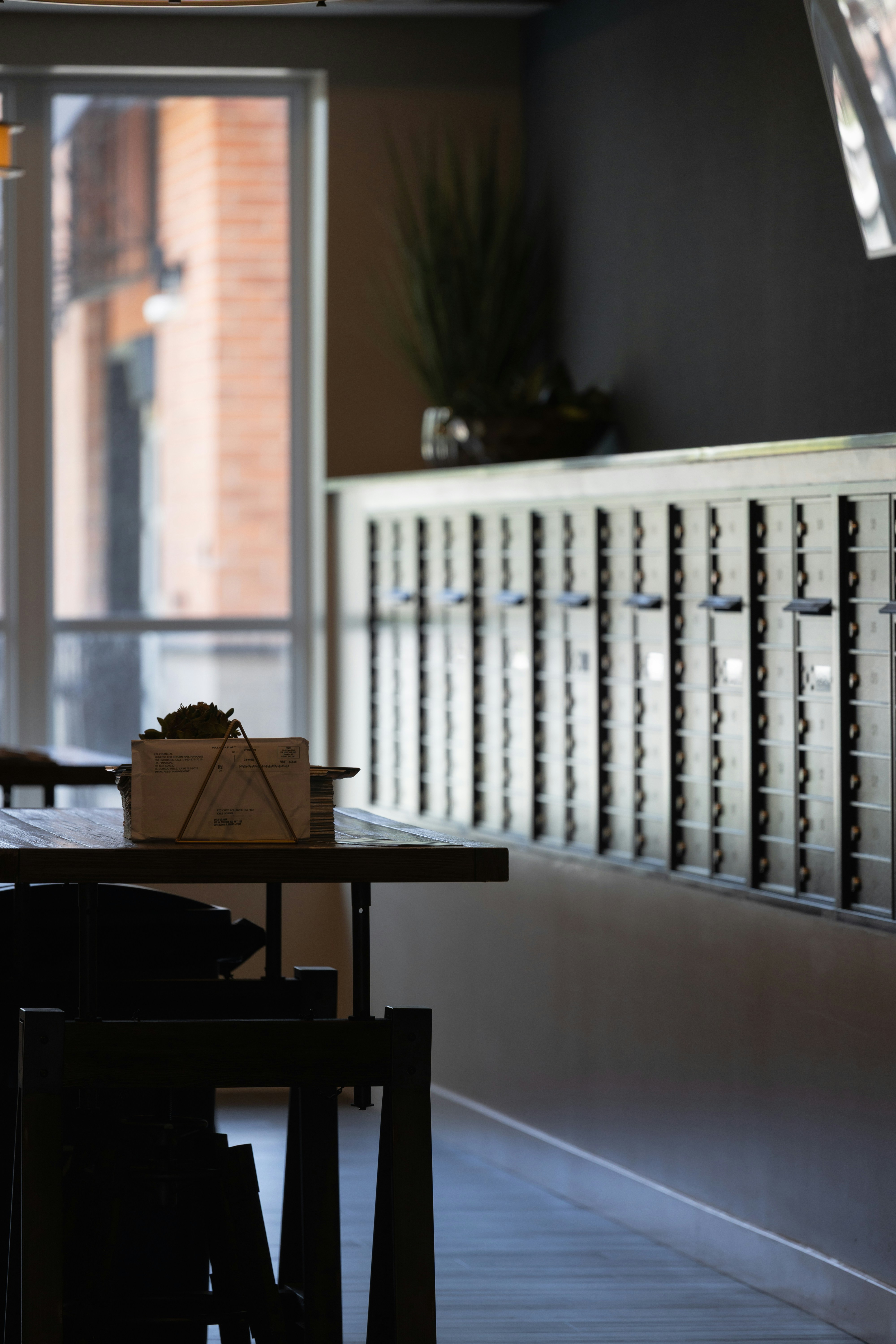 Quiet Café Corner: Sunlit Table and Locker Row