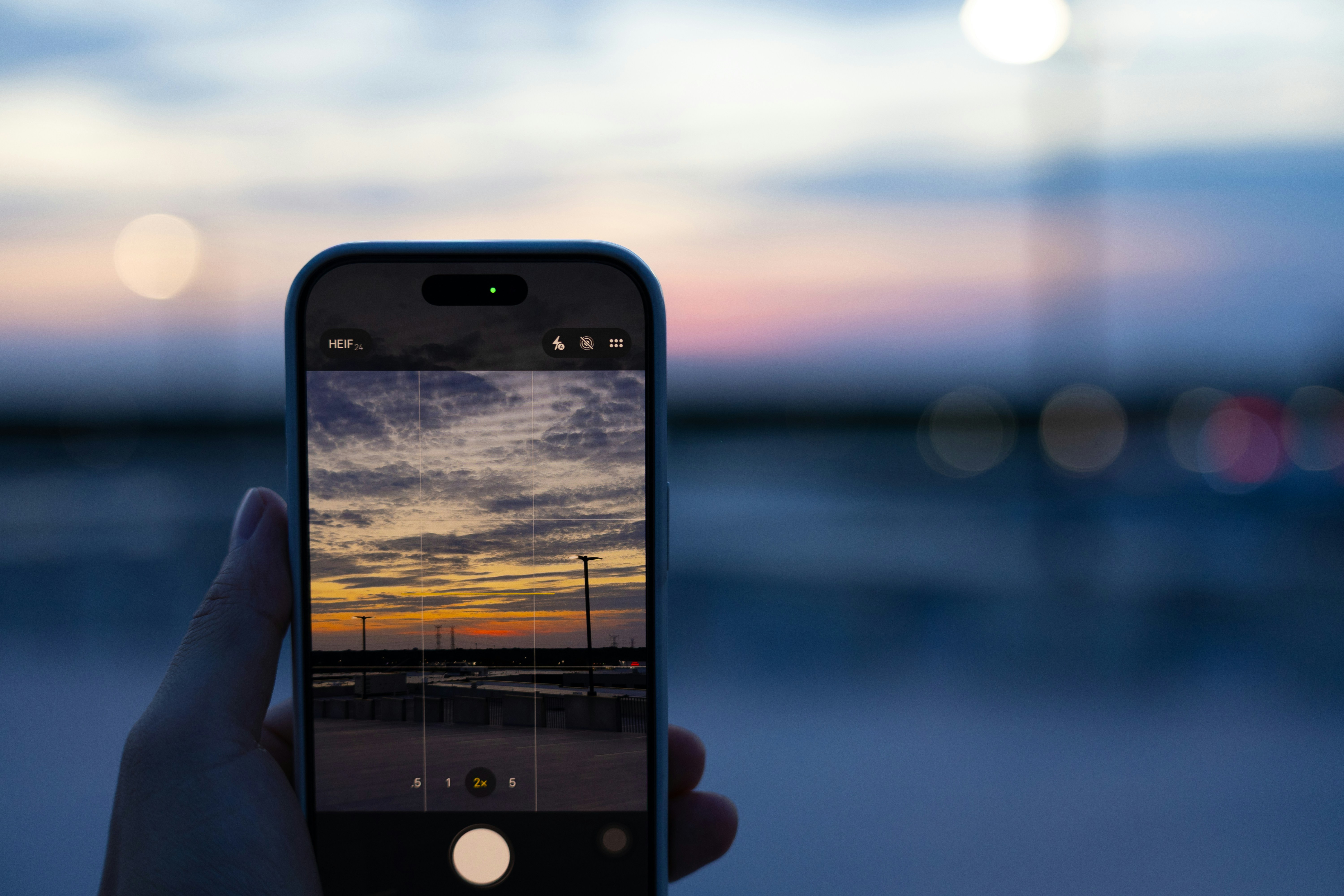 Grain of Light: Sunset Framing through a Handheld Phone