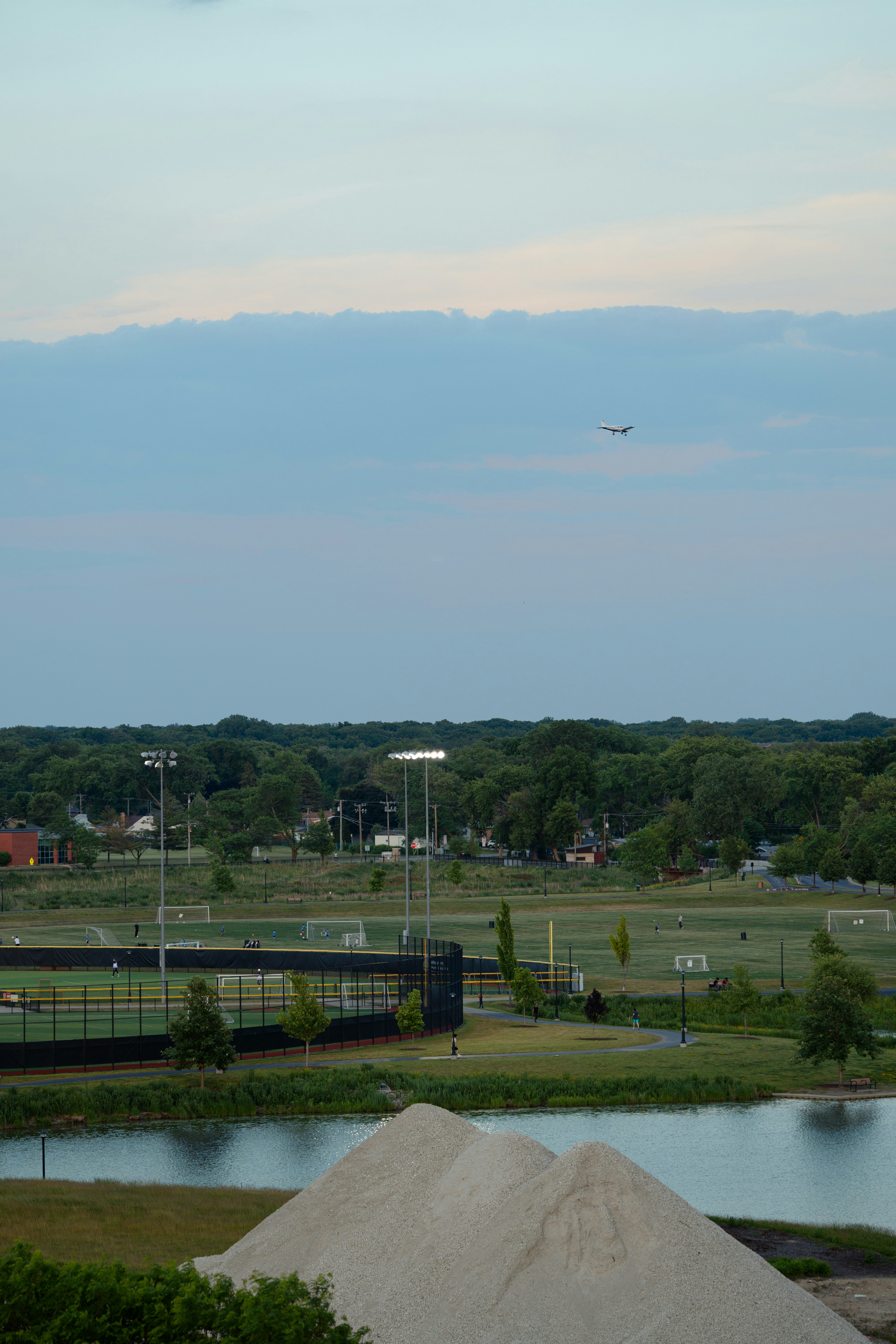 Midday Flight Over a Quiet Park