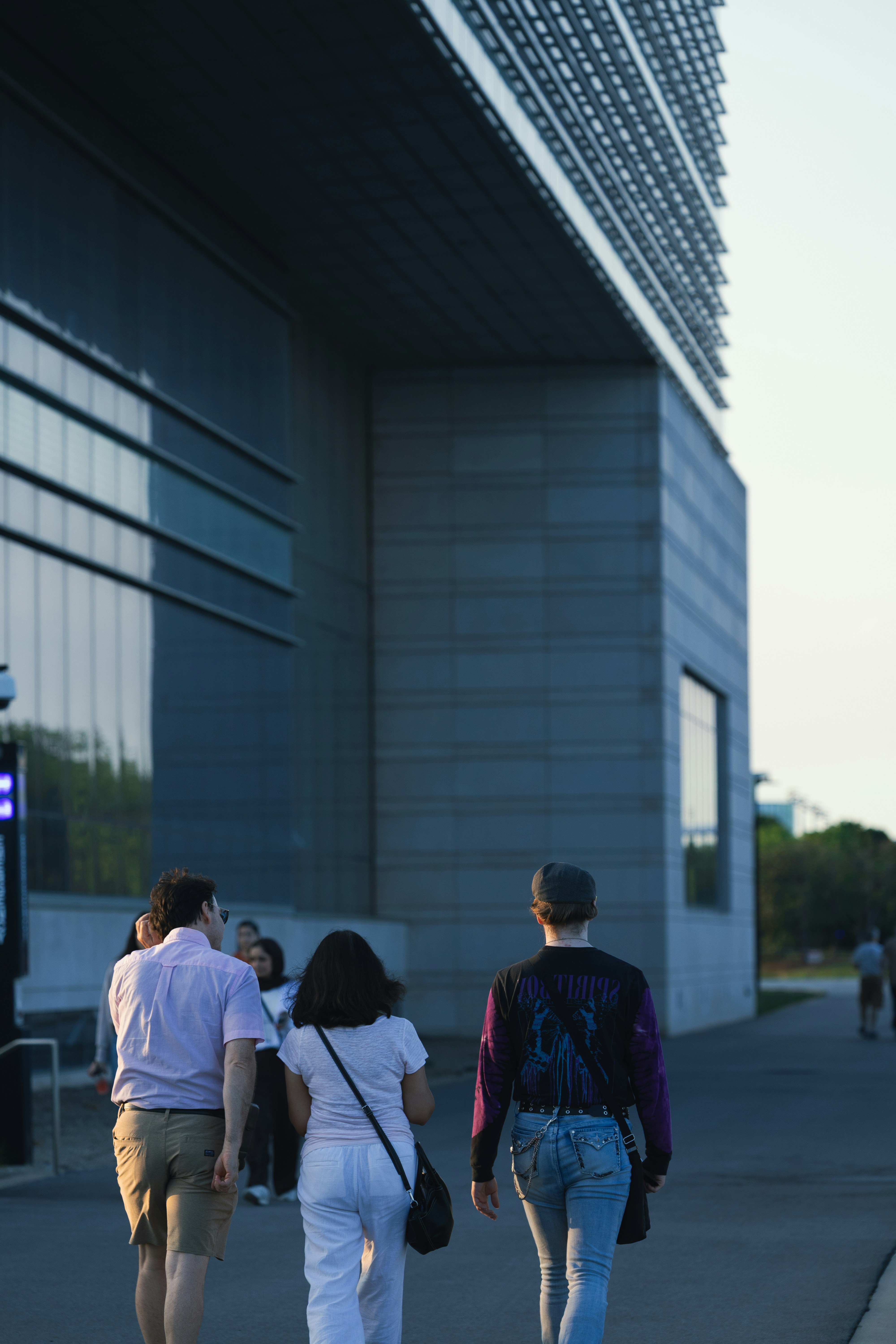 Urban Crossing: Group of Friends Near a Modern Building