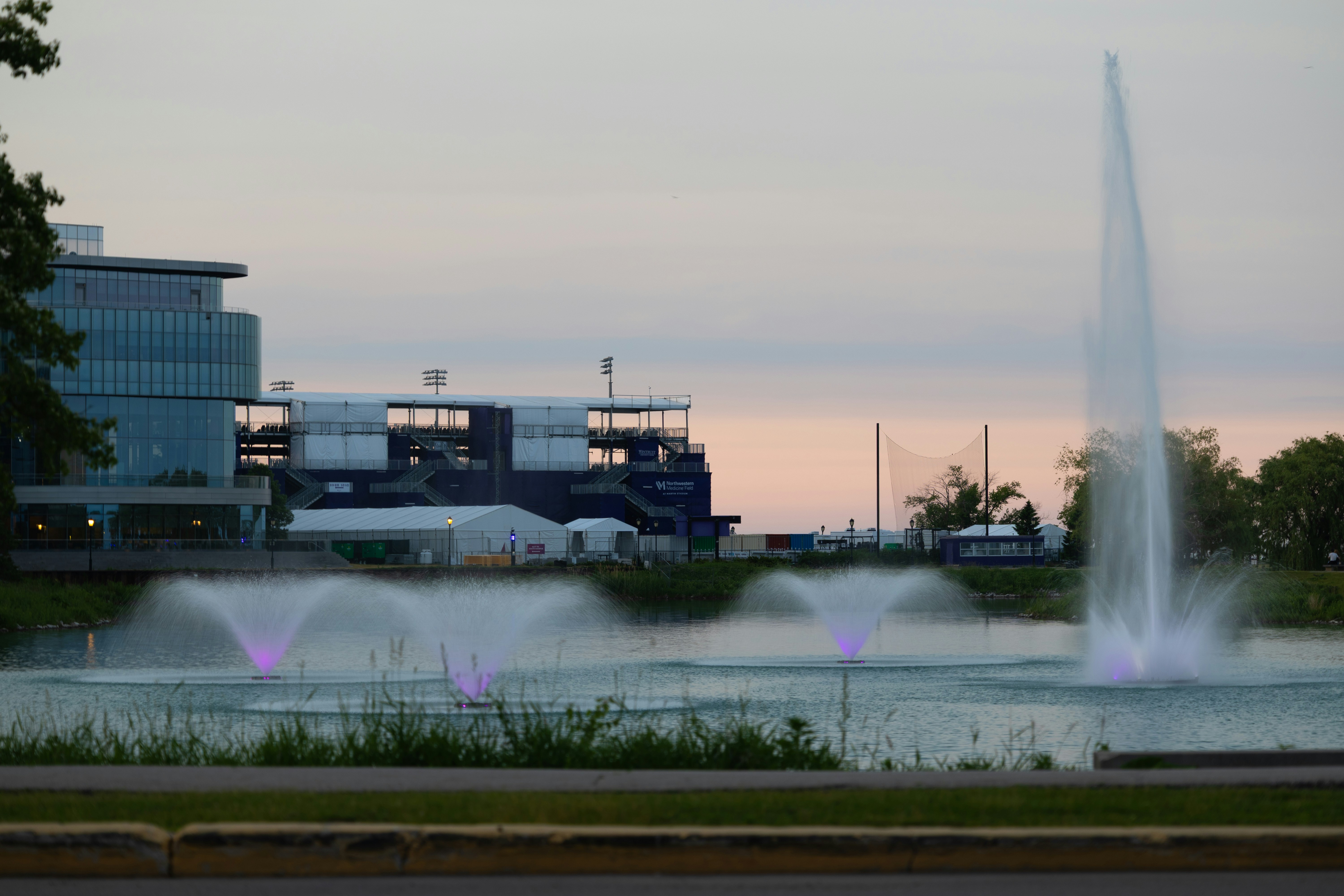 Fountain Symphony: Evening Jets Over a Glassy Lake