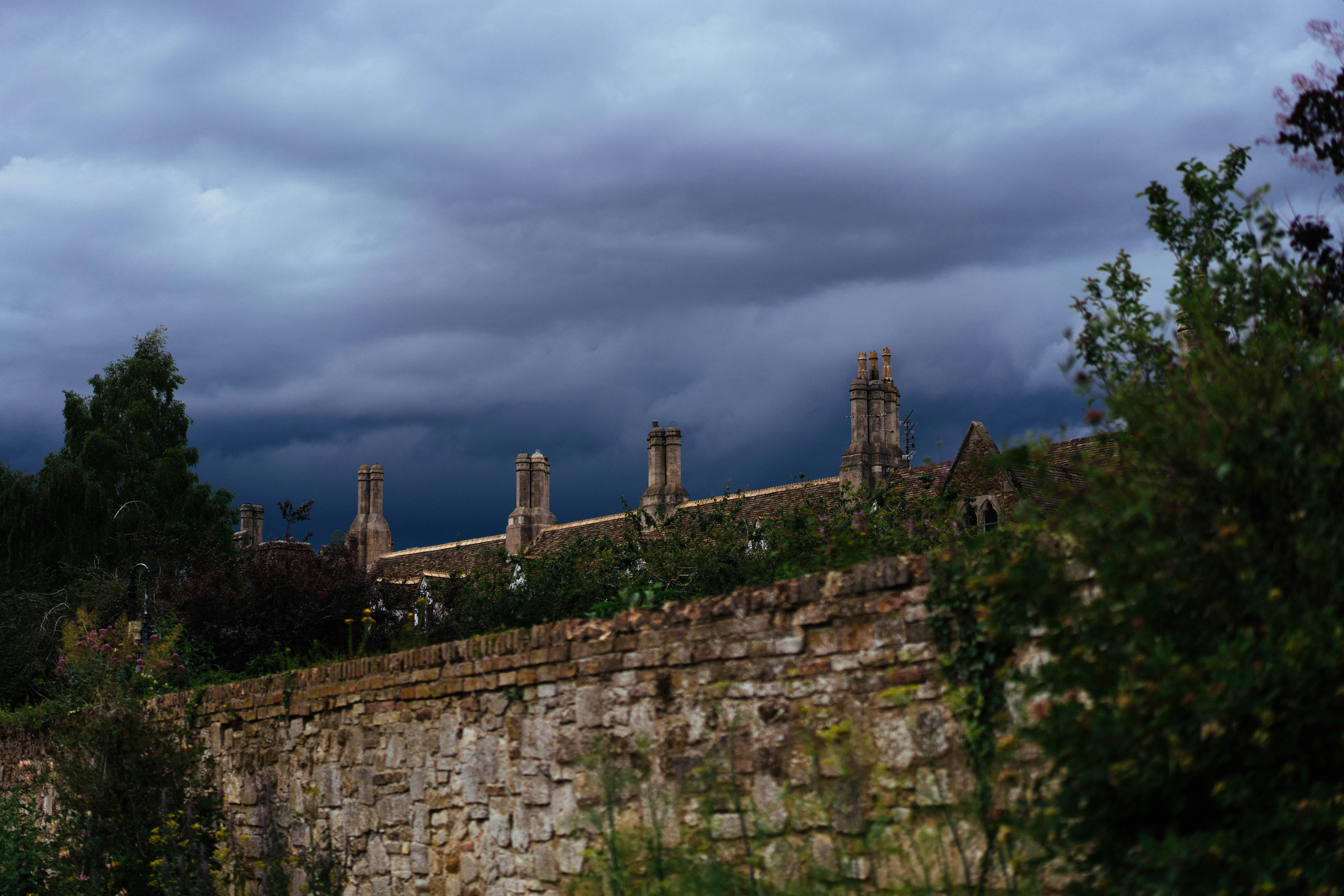 Weathered battlements under a brooding sky