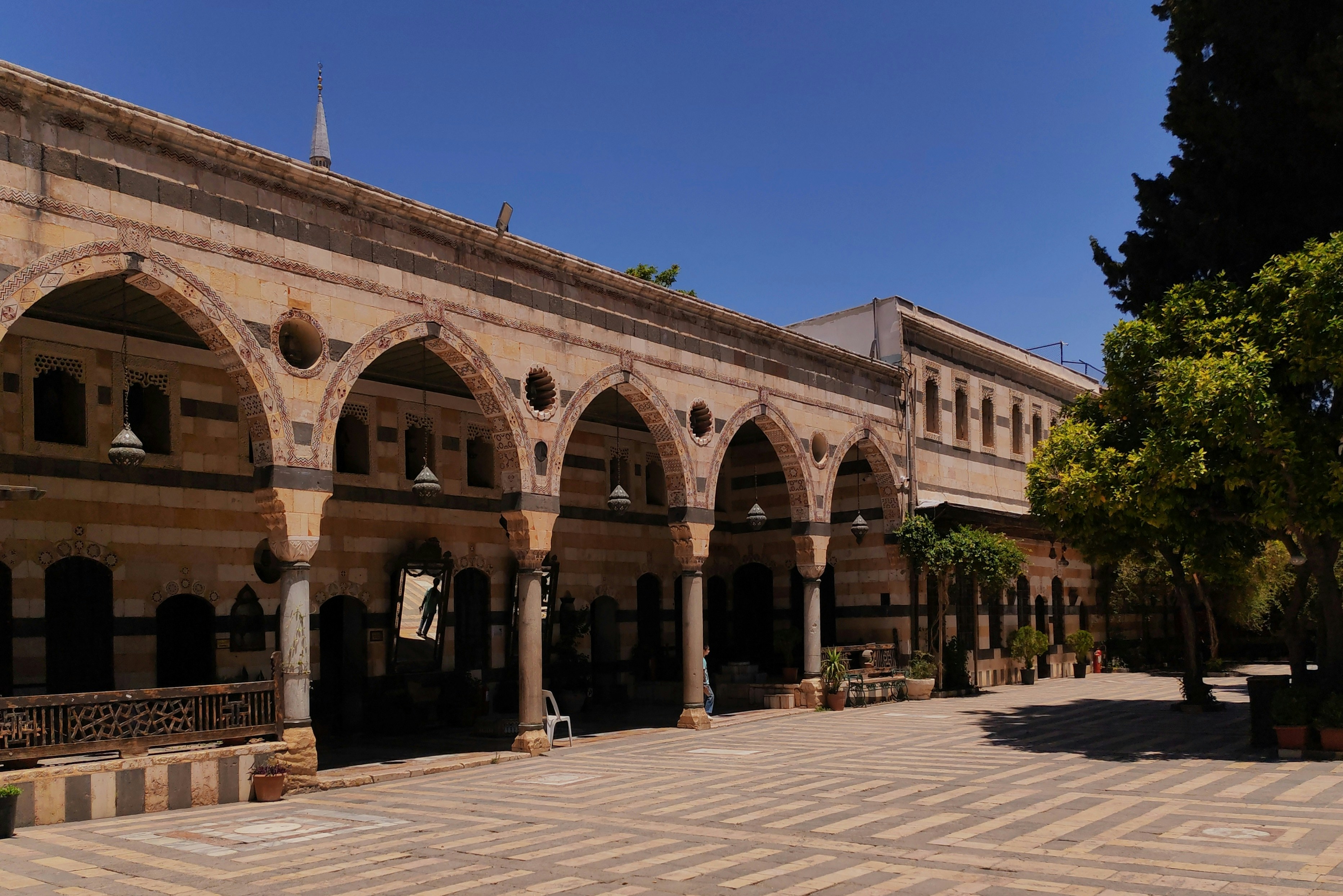 Arcaded Courtyard Under Clear Sky