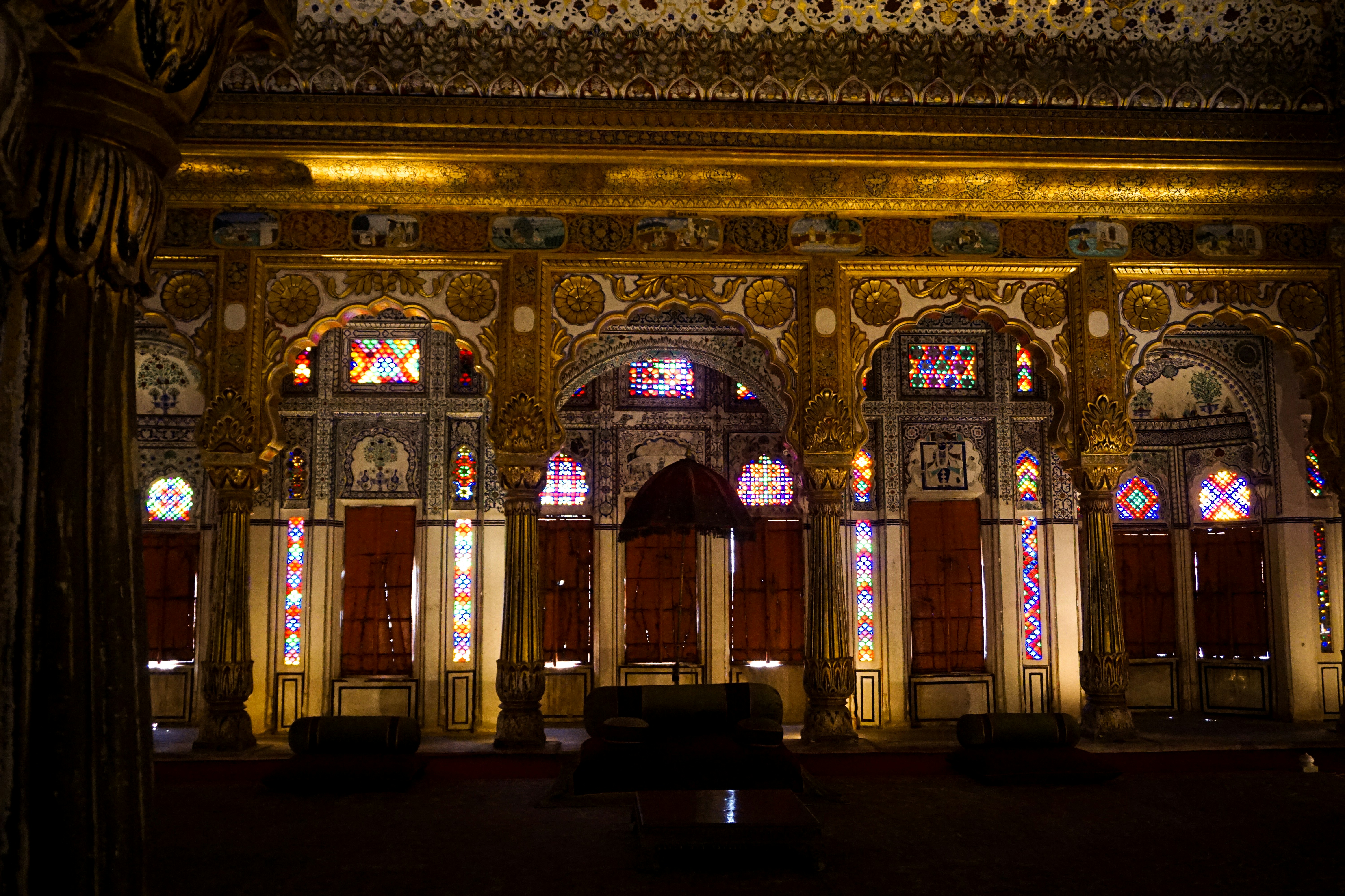 Golden Arches and Stained Light: A Quiet Shrine Interior