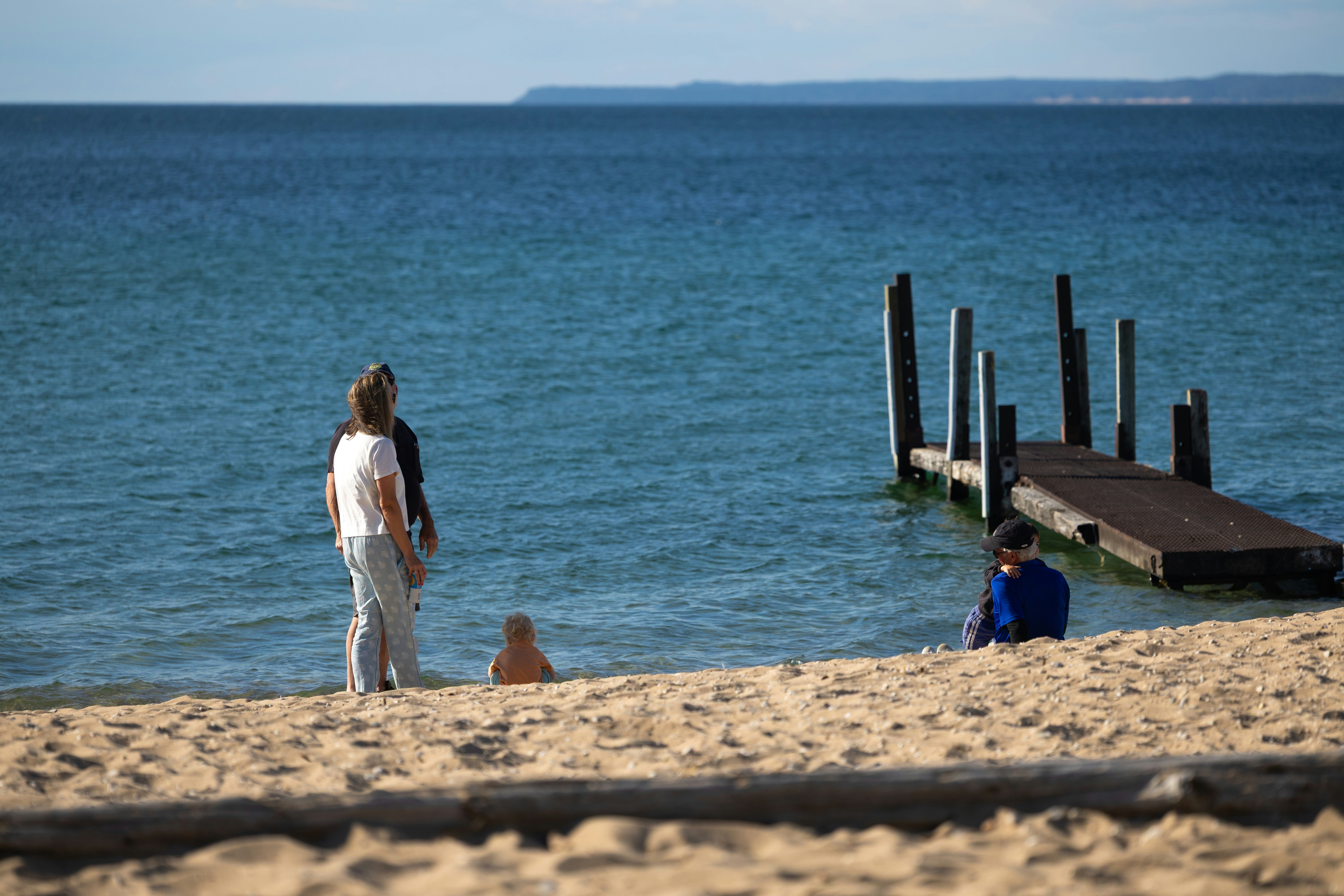 Beach Portrait by the Docks: Family Moments at Distant Horizon
