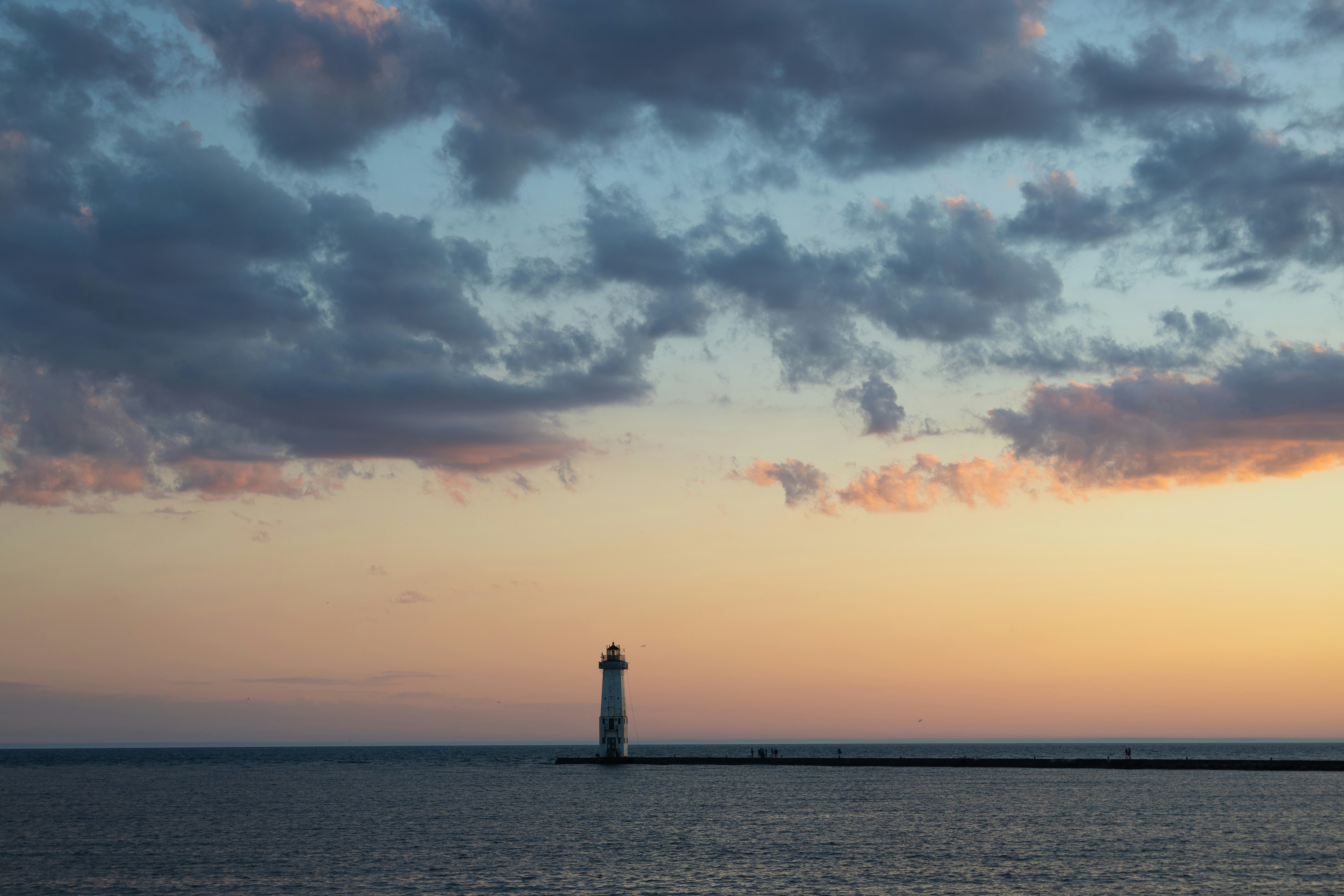 Lighthouse at Dusk: A Quiet Beacon Over Calm Seas
