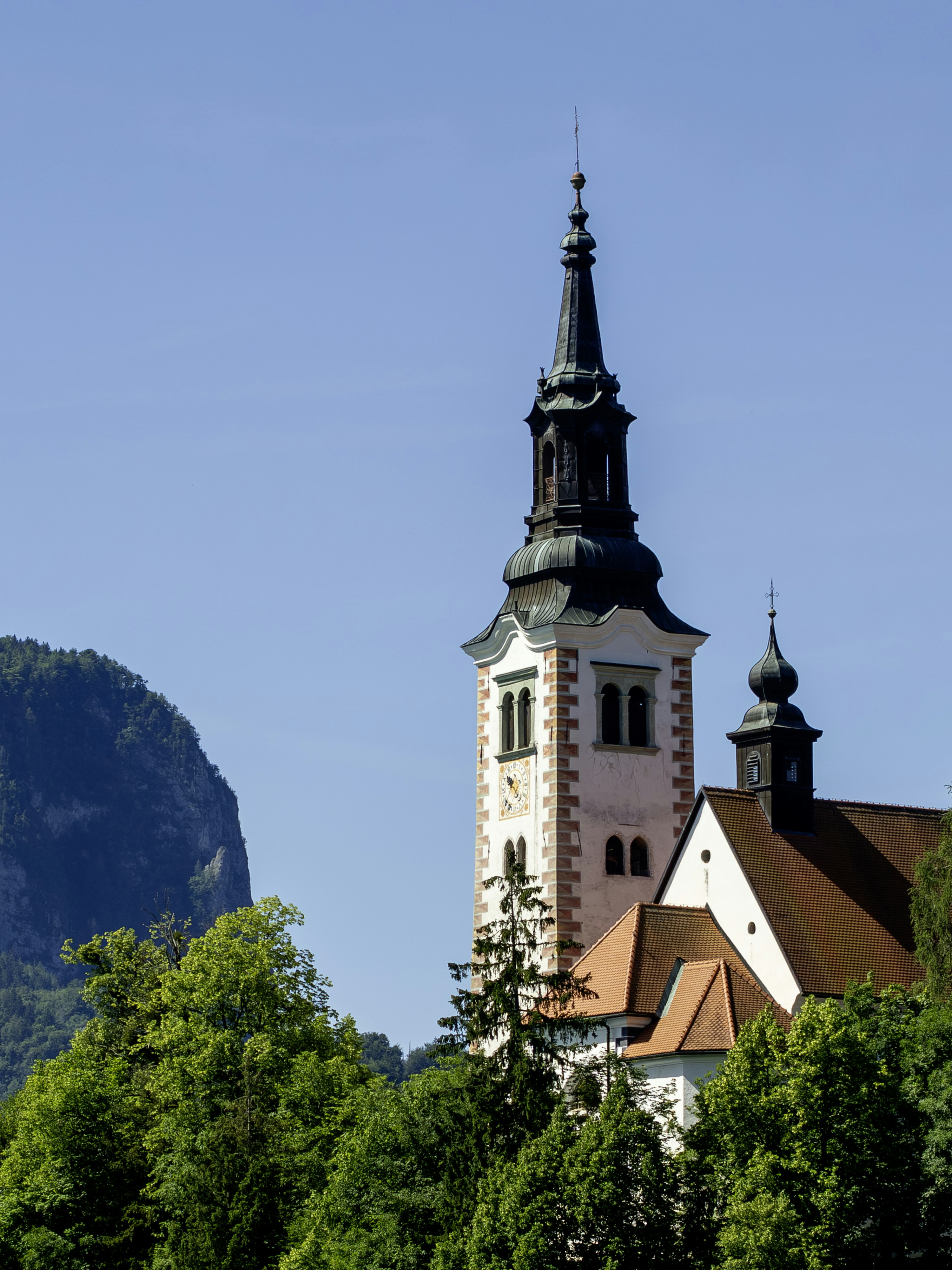 Towering Spire Against a Clear Blue Sky