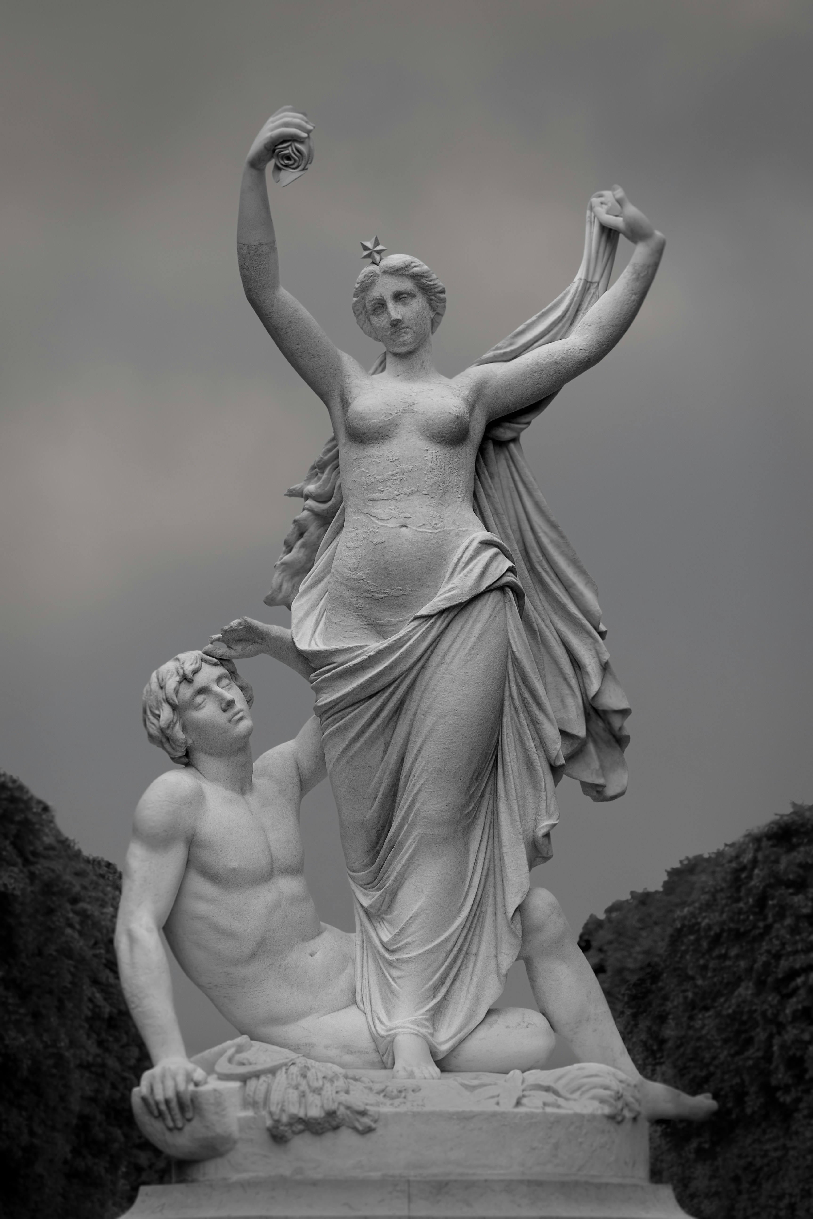 Winged Triumph Over Time: A Statue in Soft Focus