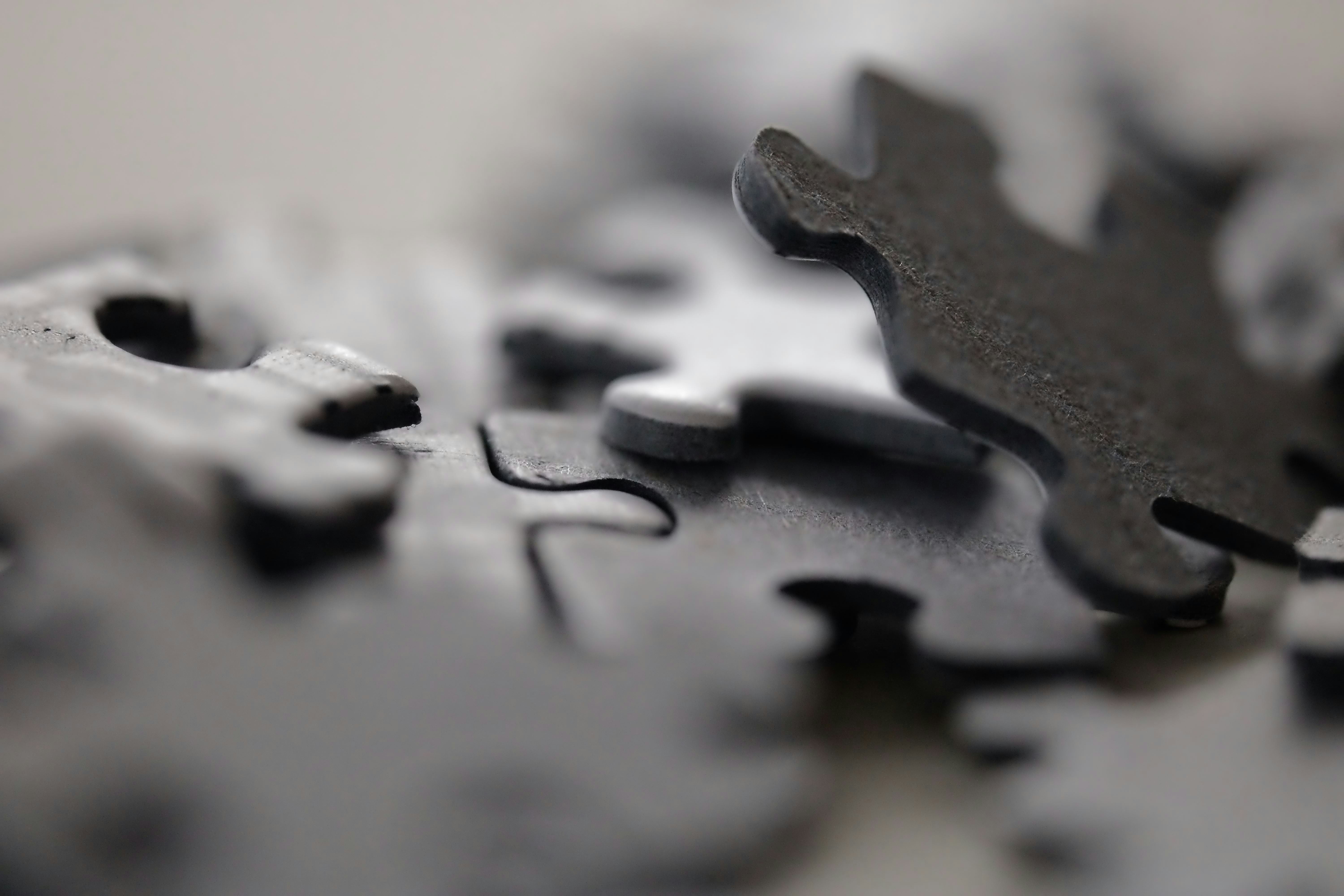 Close-up of Interlocking Puzzle Pieces in Soft Focus