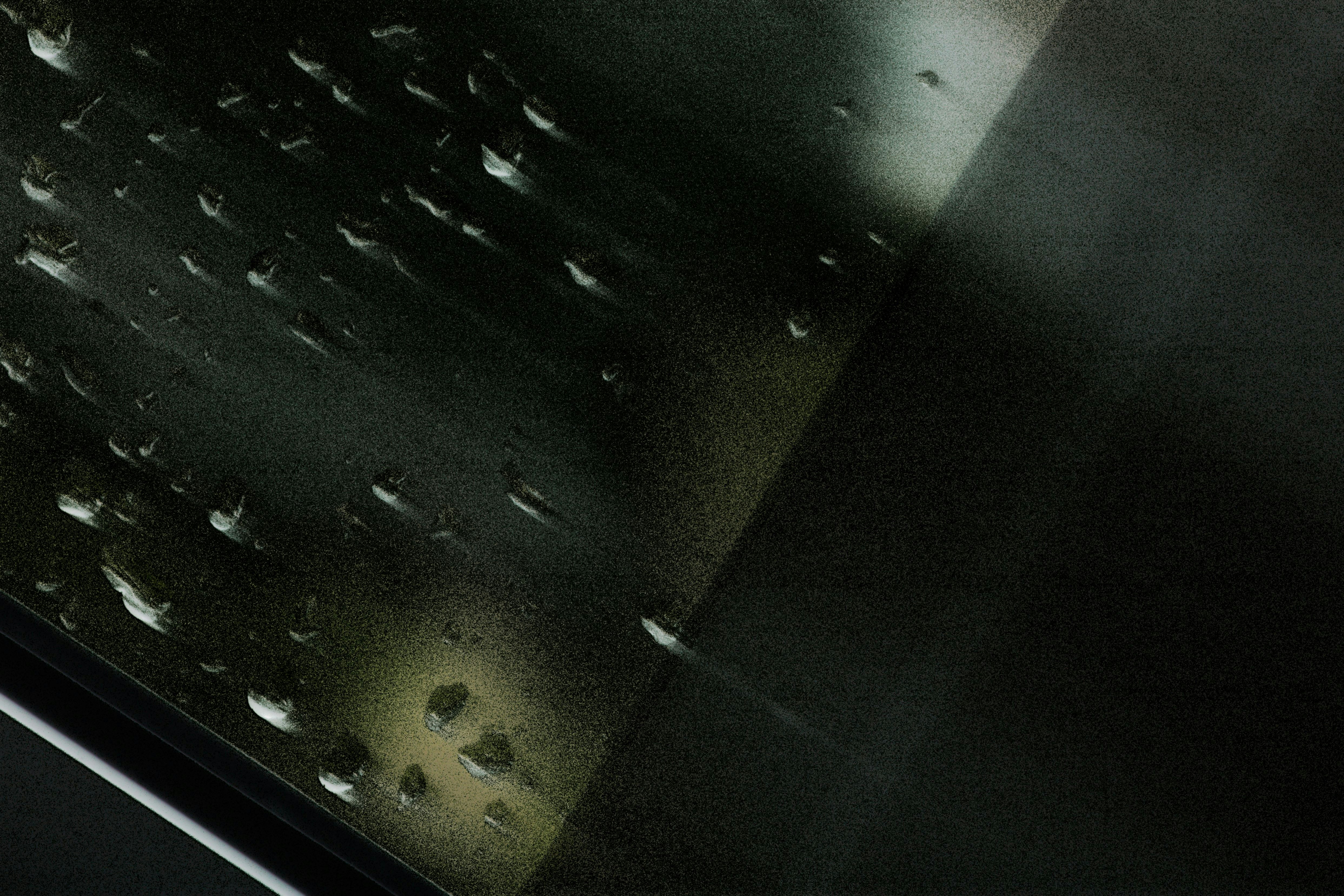 Shaded Panel with Rain-Dotted Glass Edge