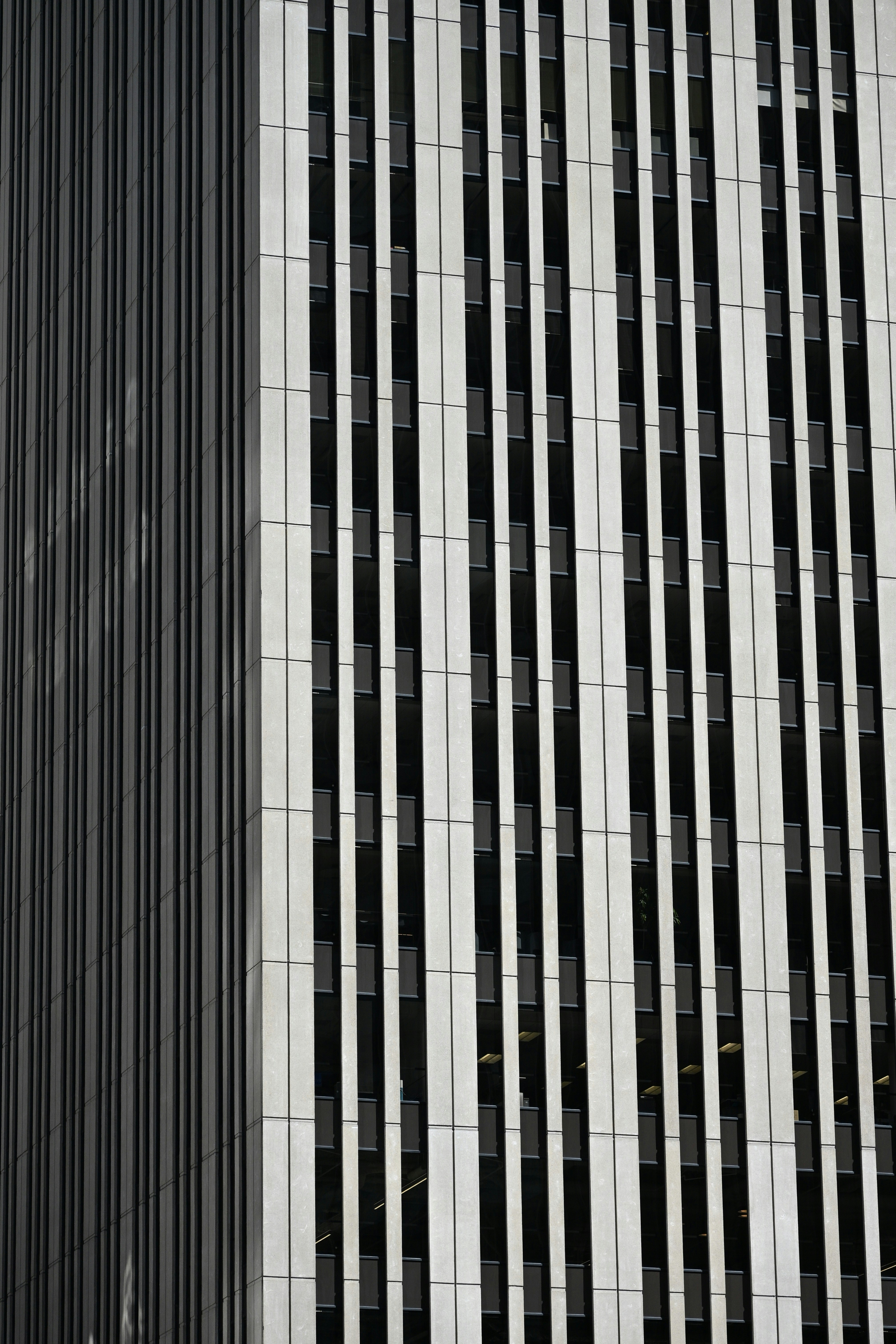 Vertical Rhythm: A Facade of Repeating Shadows and Light