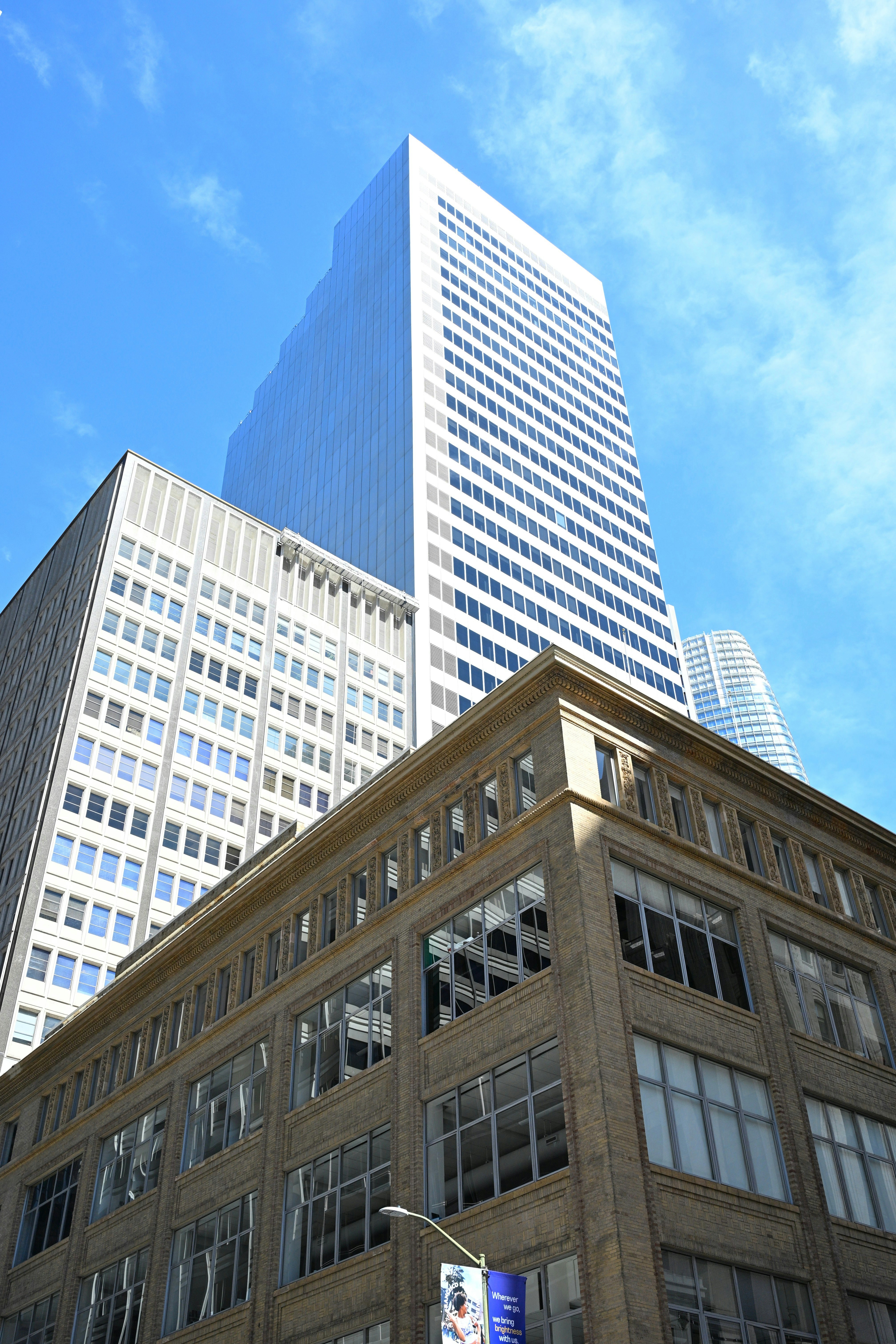 Urban Giants: A Triangle of Skyscrapers Reaching the Blue Sky