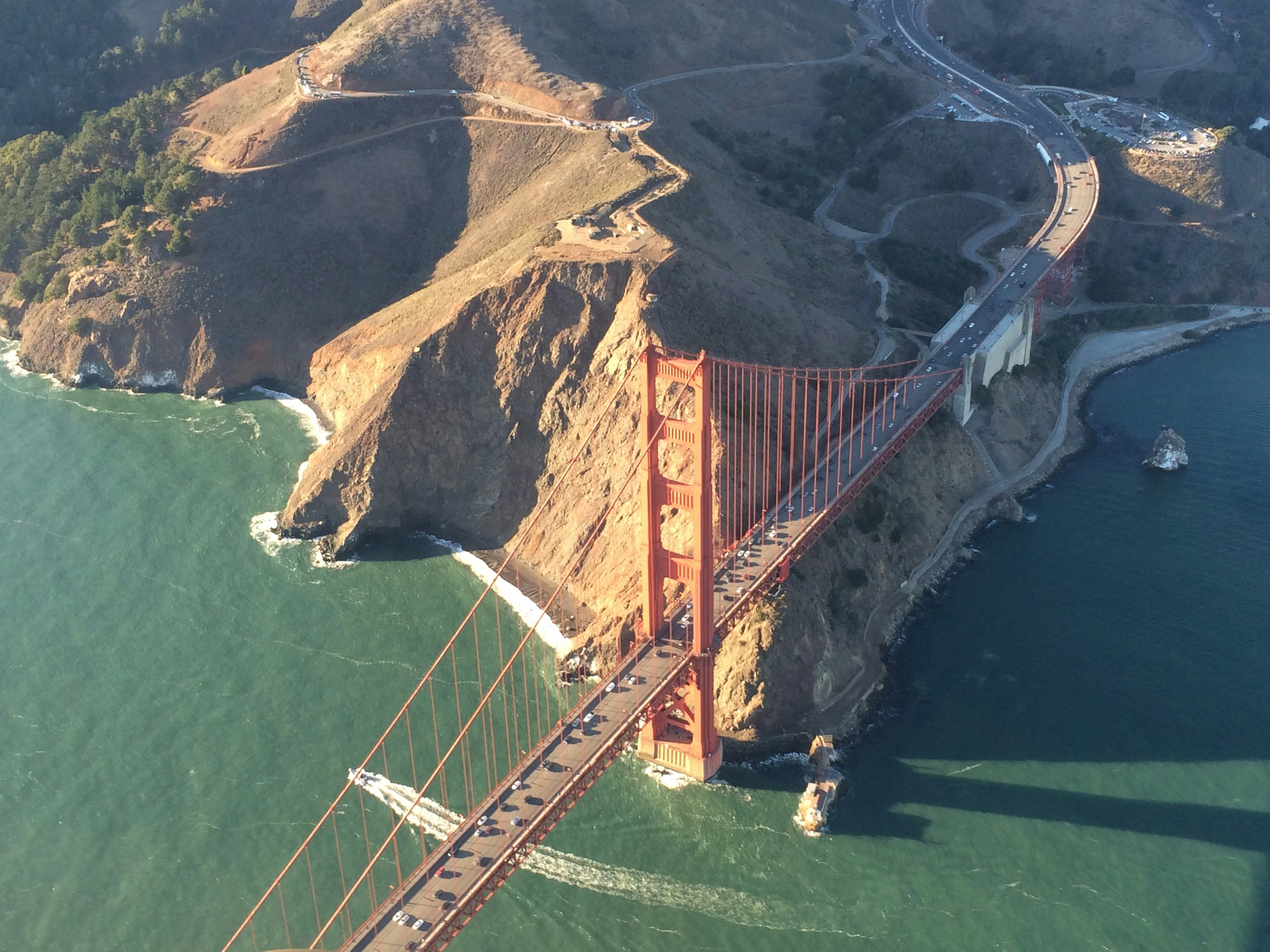 Golden Gate Amid Cascading Shadows: Aerial View of the Bridge