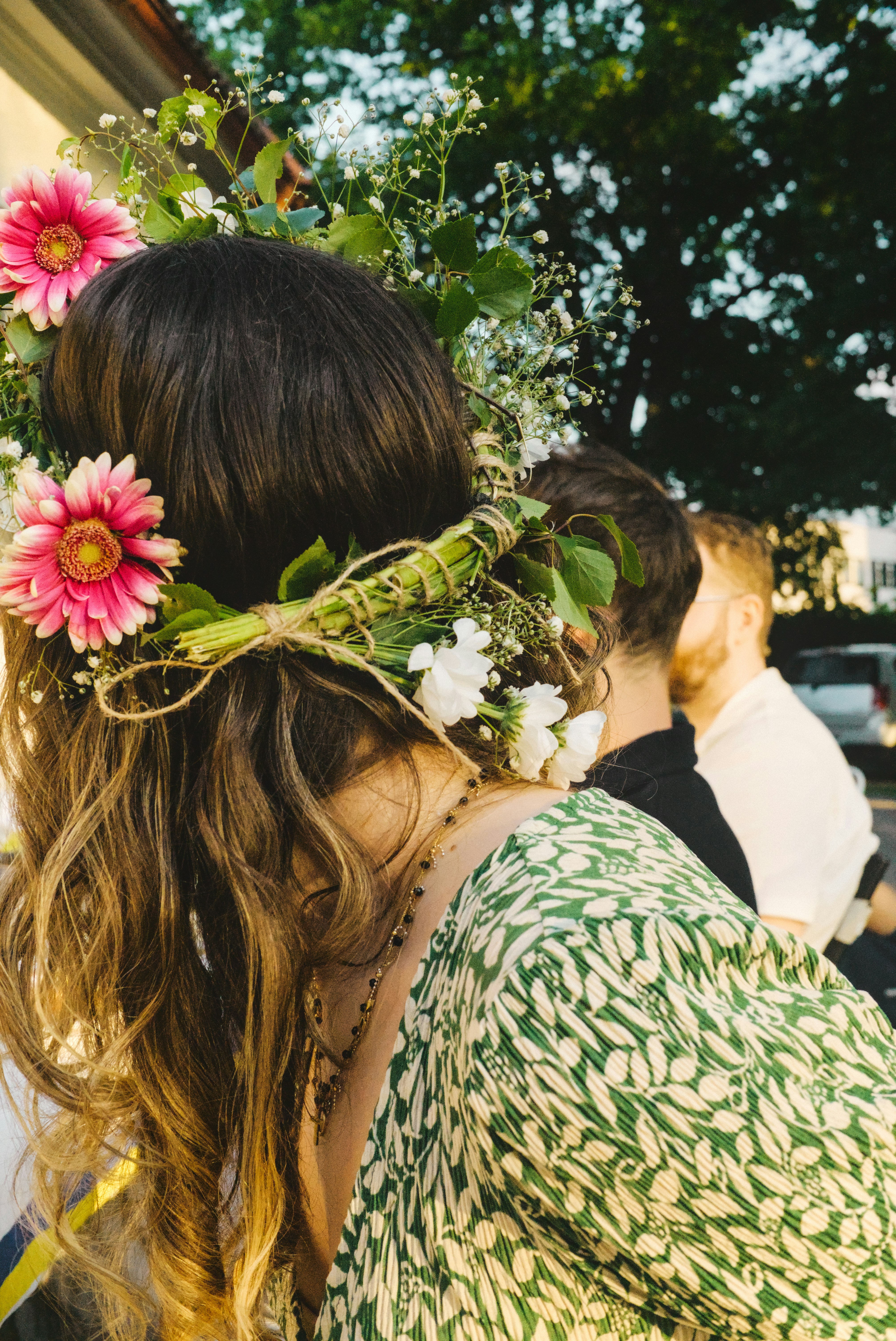 Floral Crown in Soft Sunlight: A Moment of Friendship