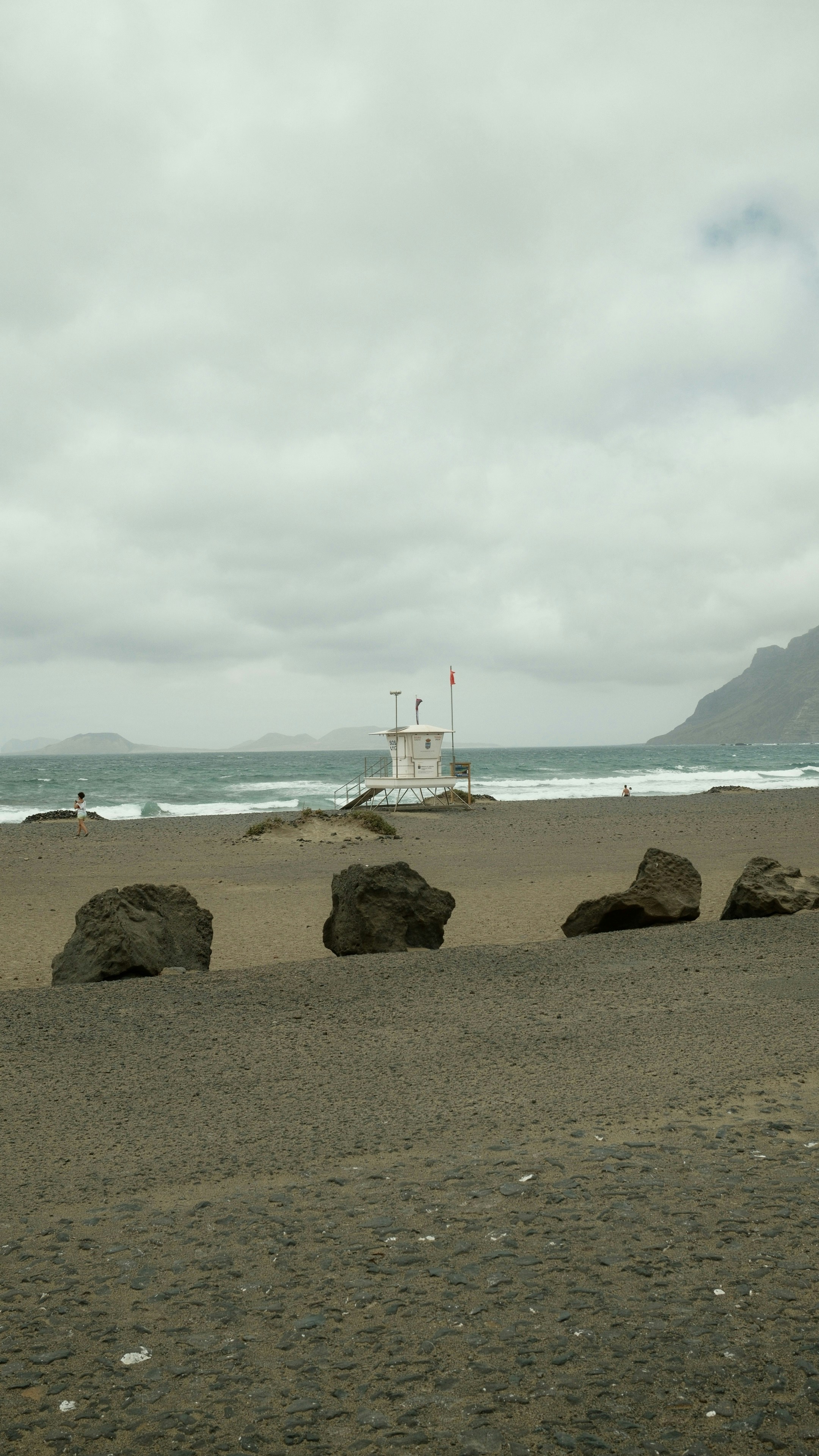 Lifeguard Tower at the Edge of Quiet Waves