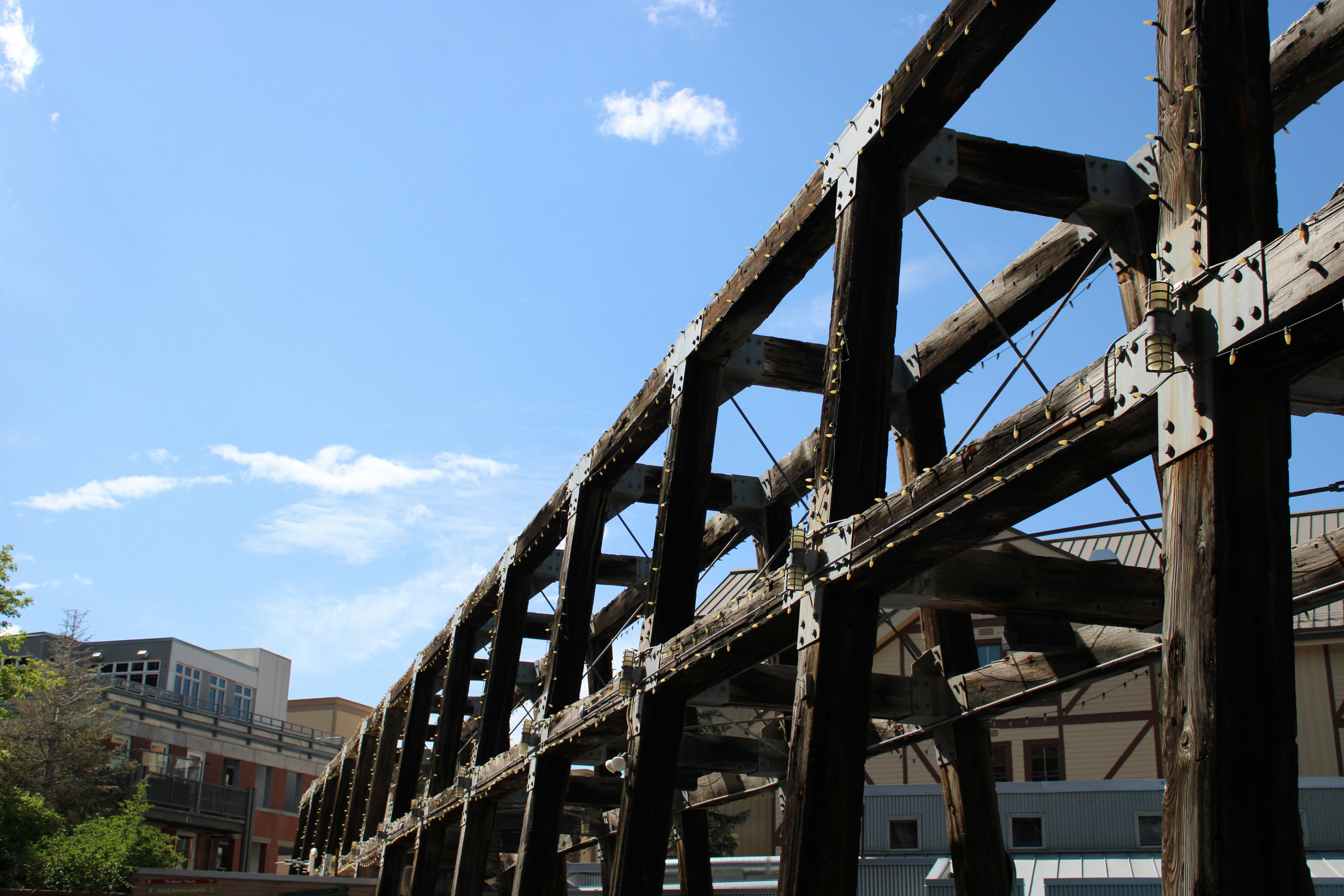Weathered Iron Lattice: A Bridge Under Clear Skies