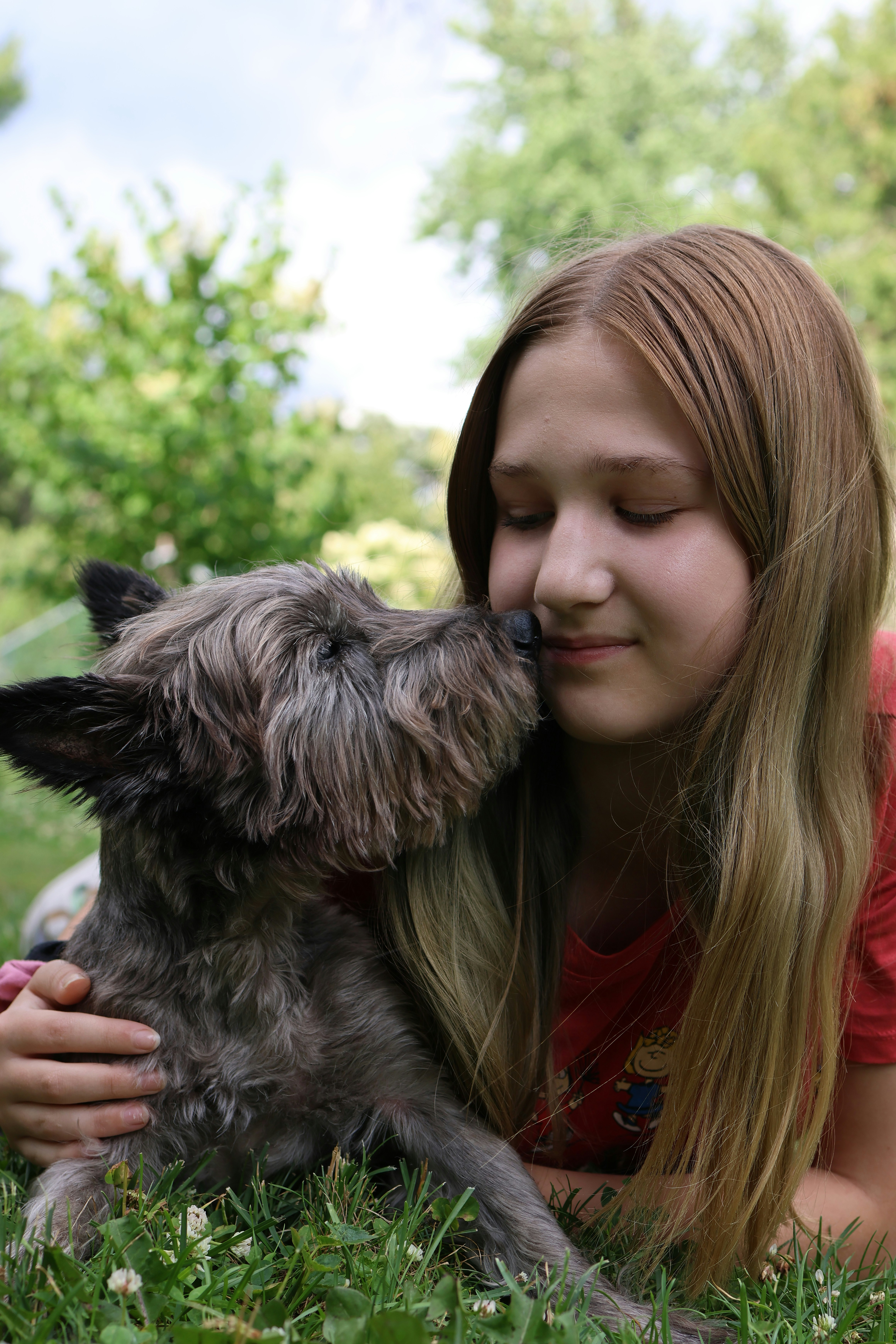 Close Communion: A Girl and Her Dog Share a Quiet Moment
