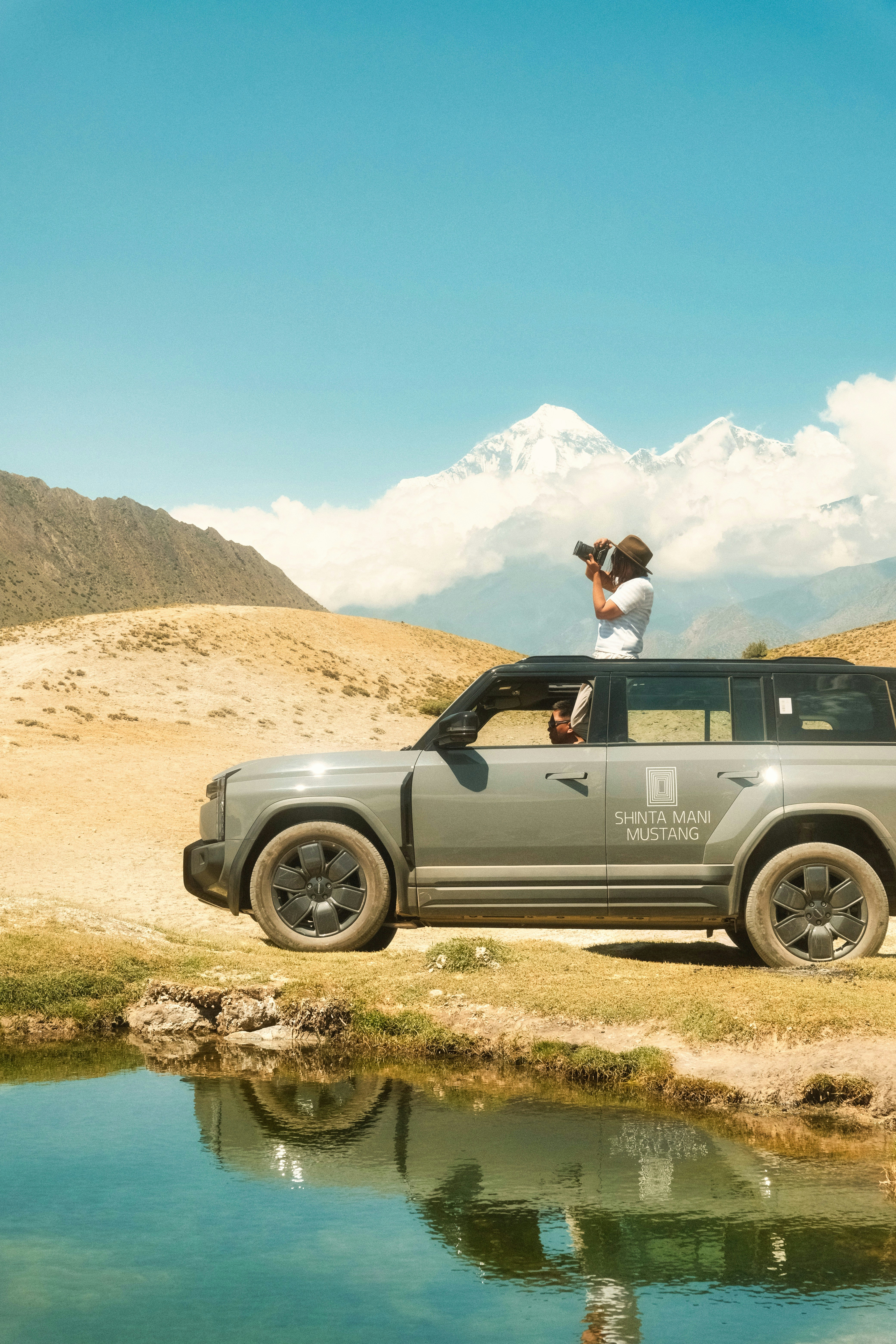 Glacial Vista: A Photographer’s Pause on a Wind-Swept Rim