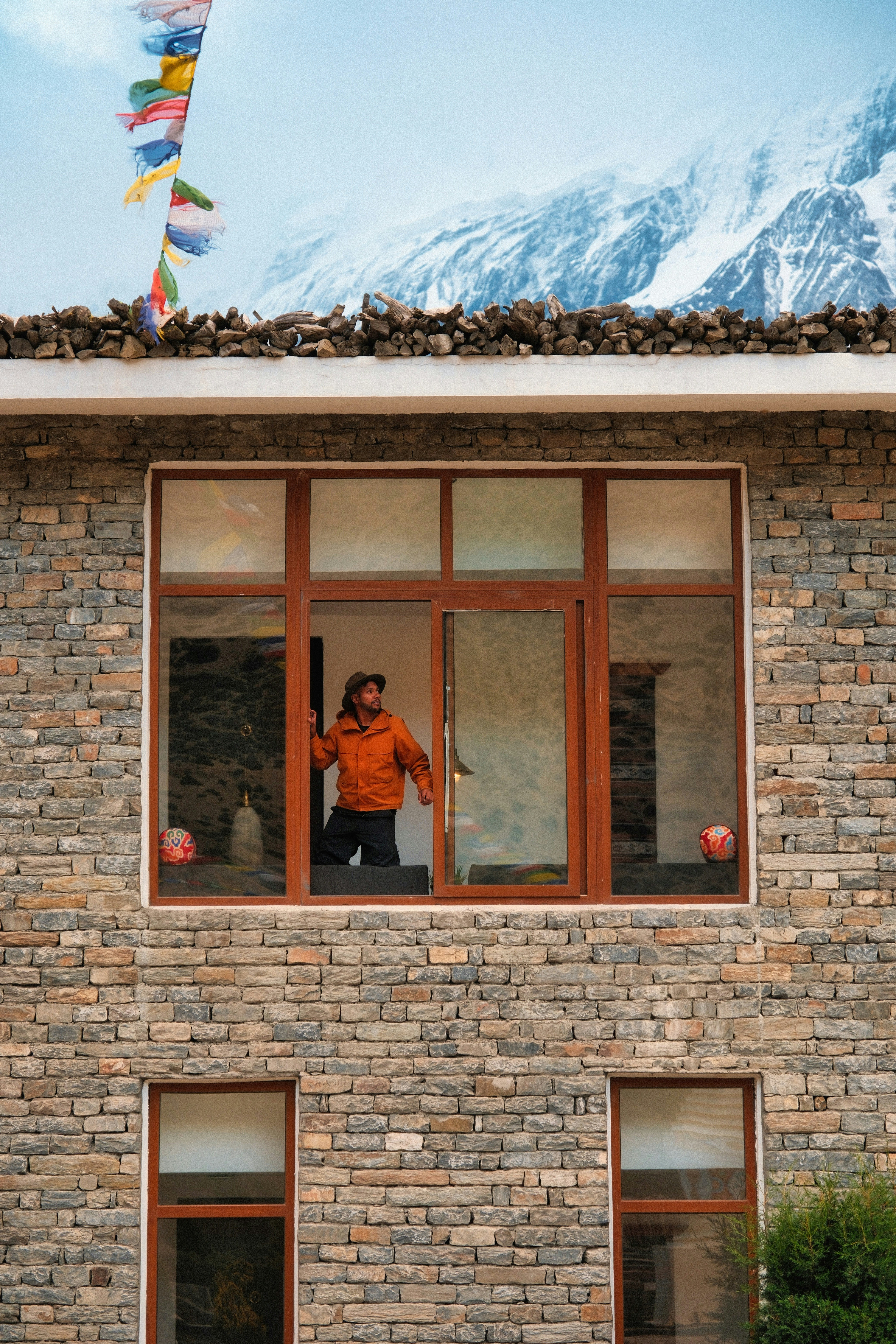 A Mountain-View Lookout: Man at the Window of a Stone House