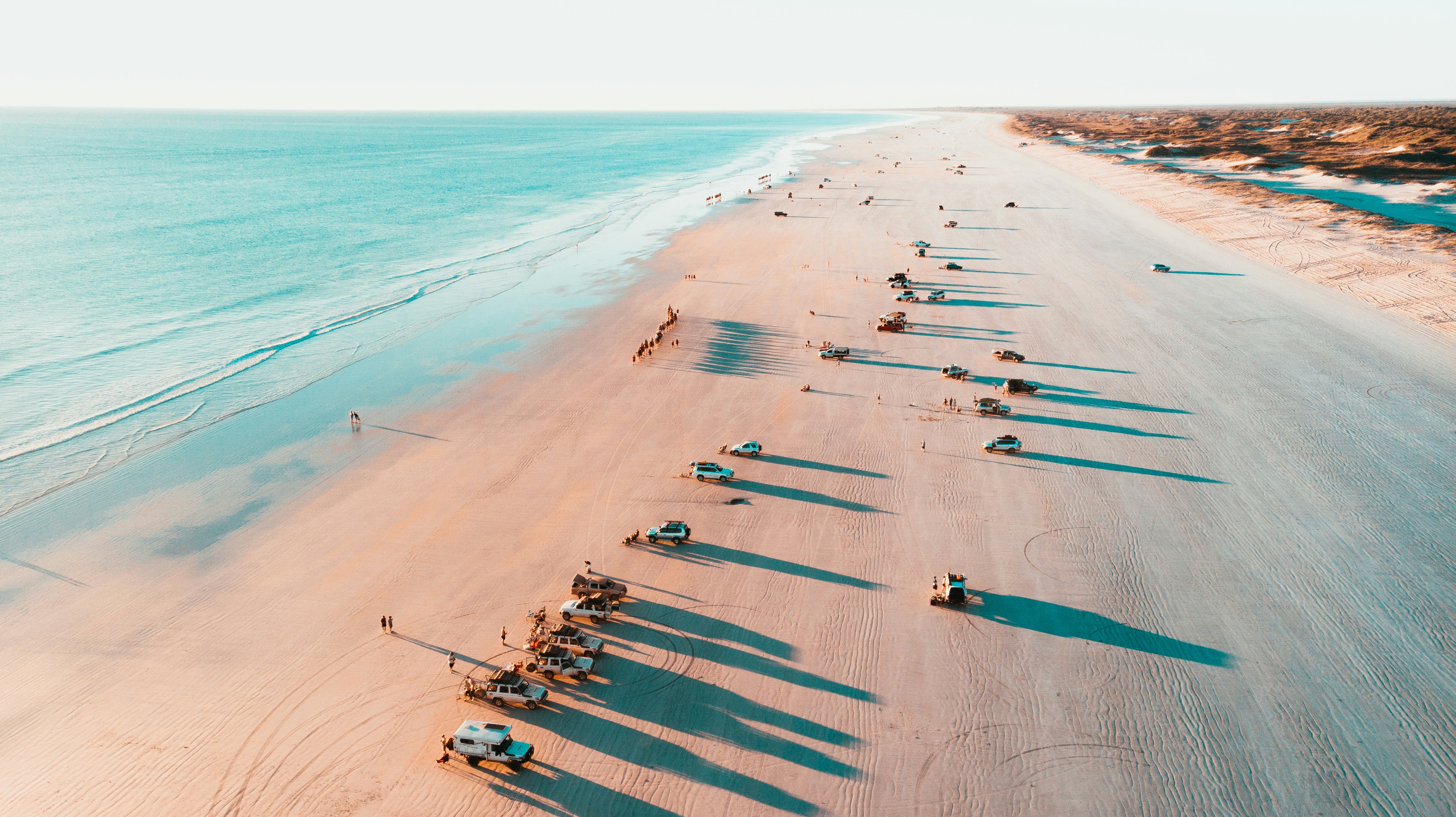 Long Shadow Parade on a Quiet Shore