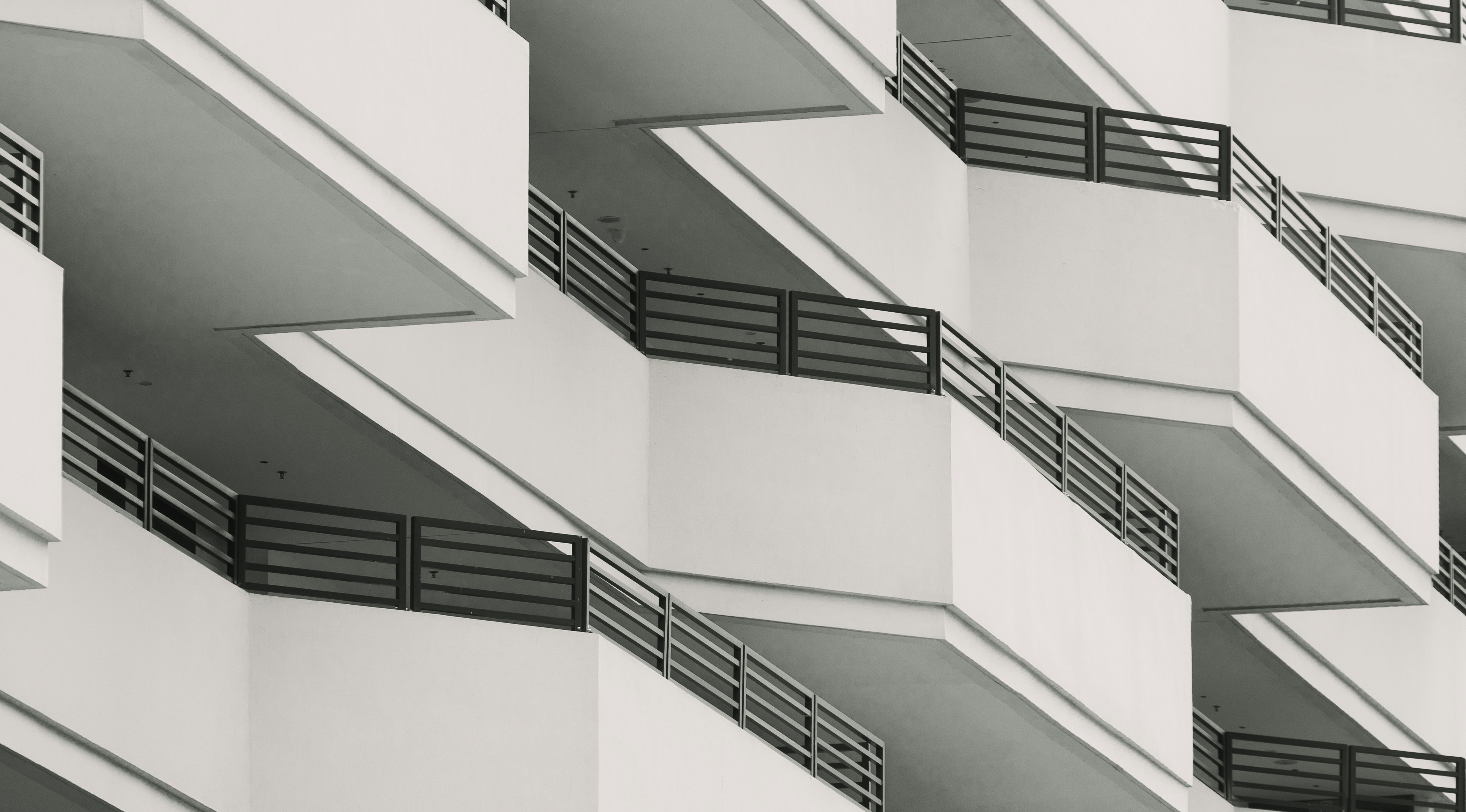 Monochrome Geometry: Repeating Balconies and Shadows