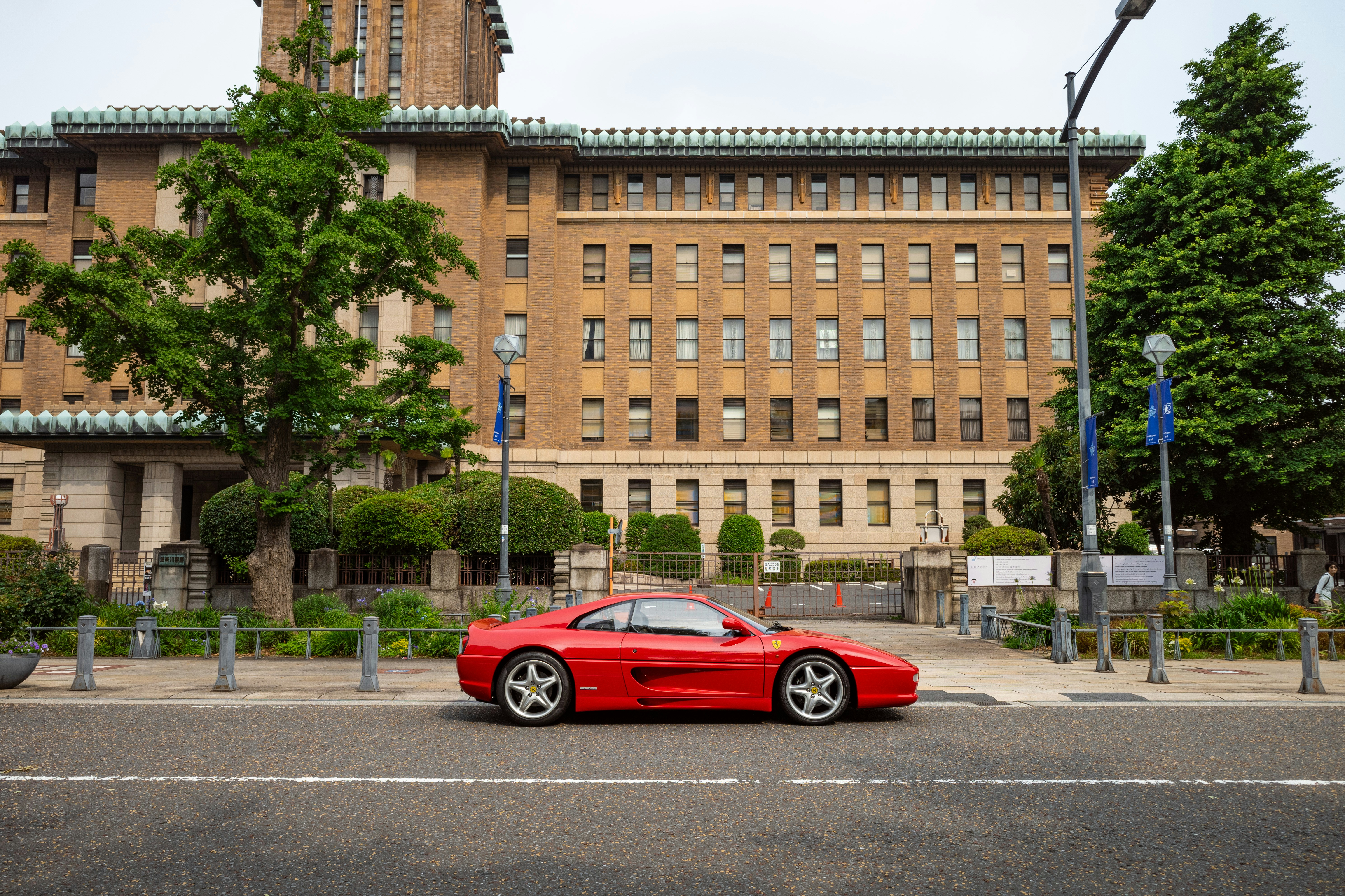Red Sportster at a Historic Facade