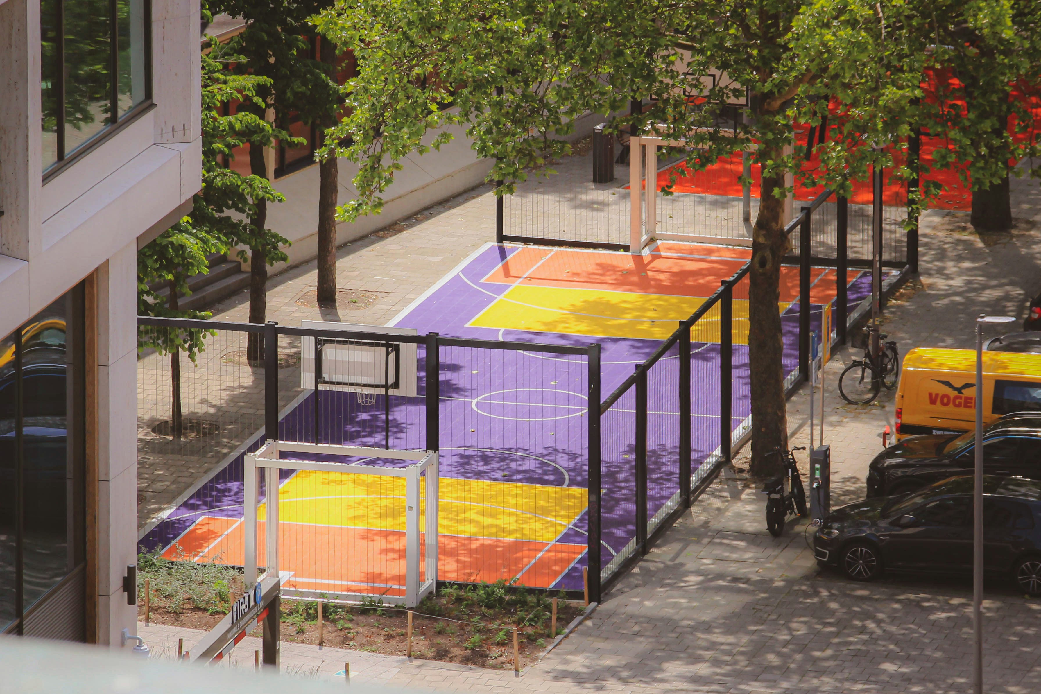 Chromatic Court: A Colorful Street Basketball Scene