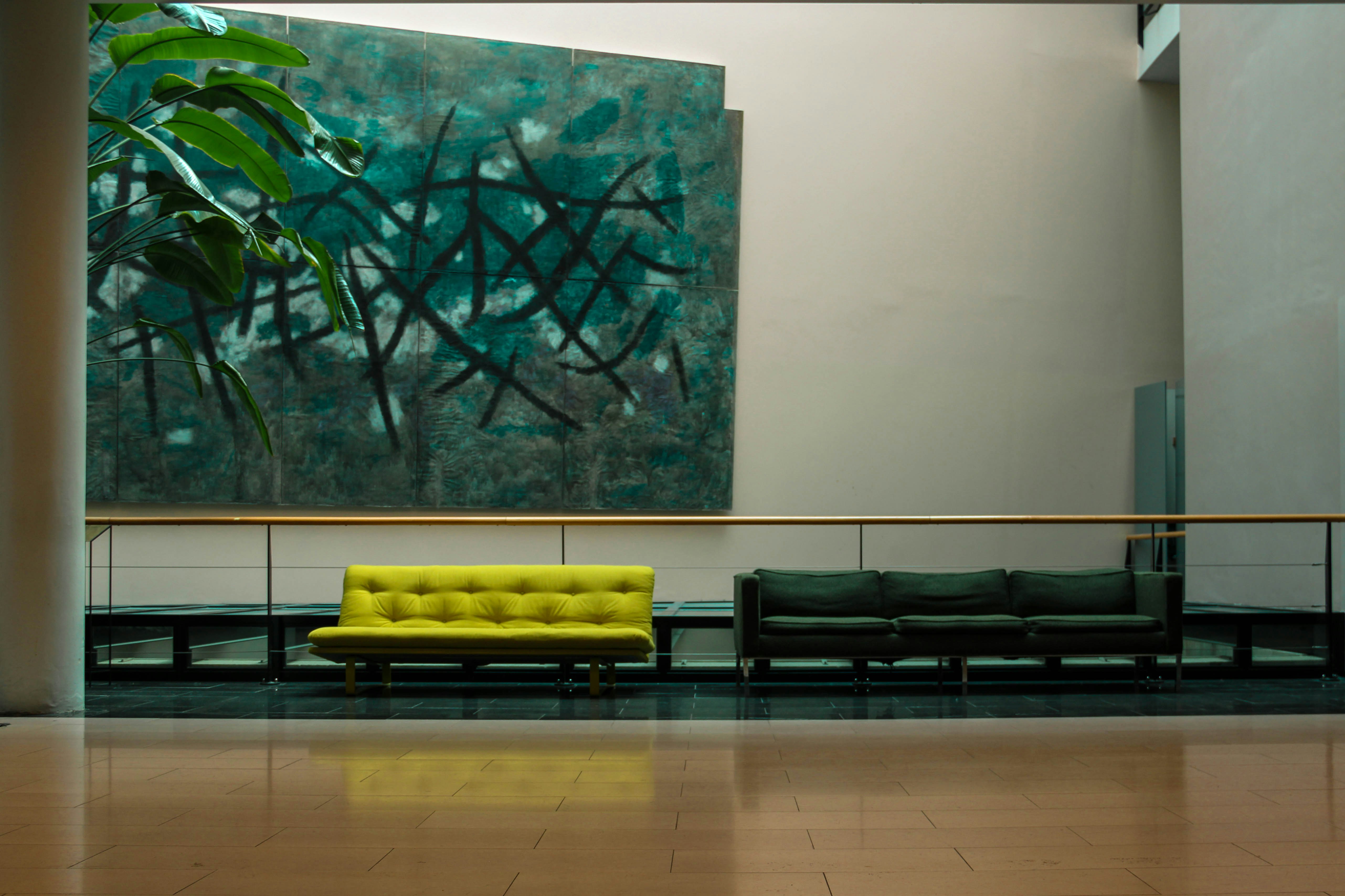Mid-Century Constellation: A Yellow Seat Among Quiet Shadows