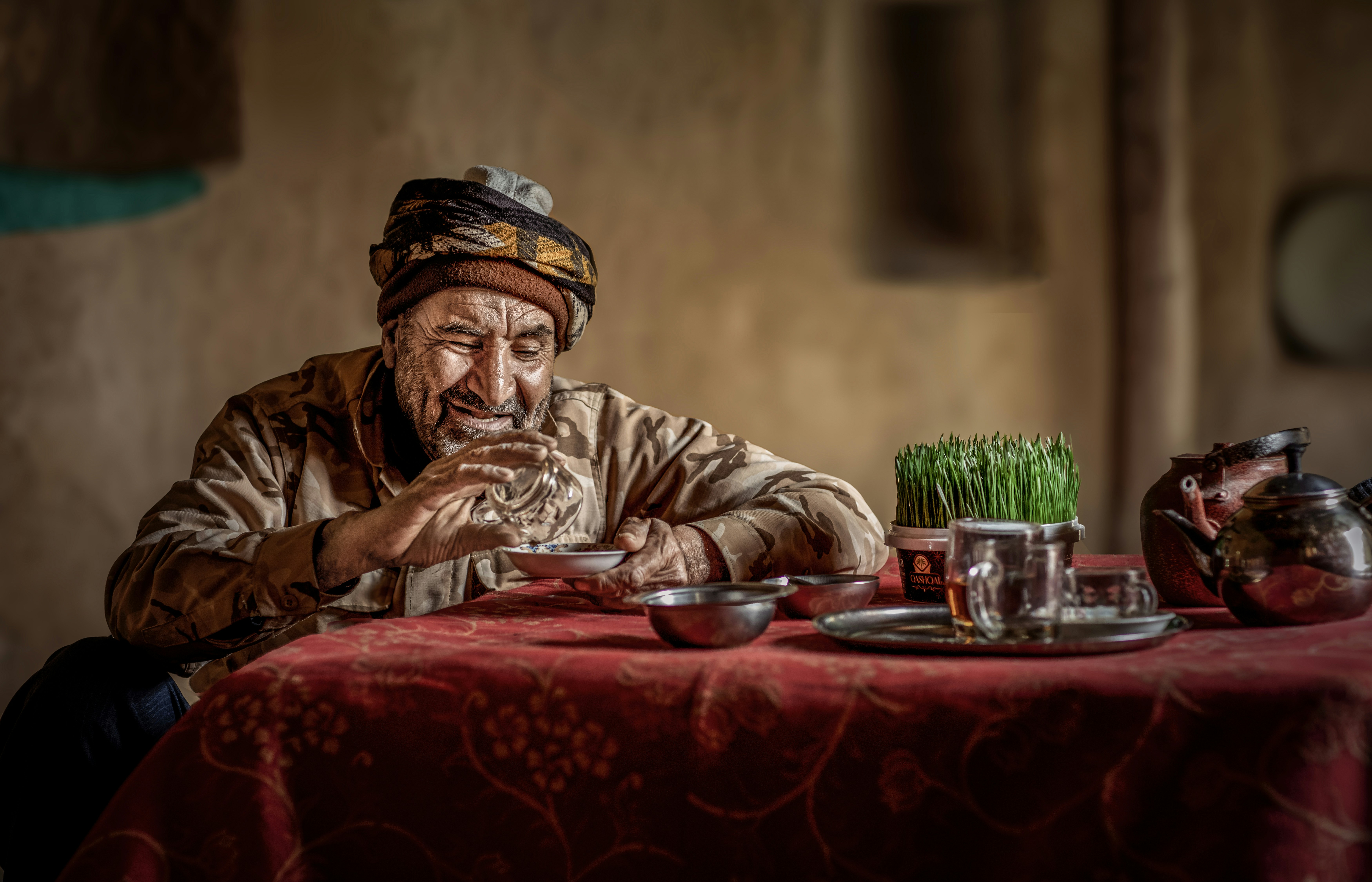Tea and Time: A Portrait of Quiet Reflection in a Rustic Kitchen