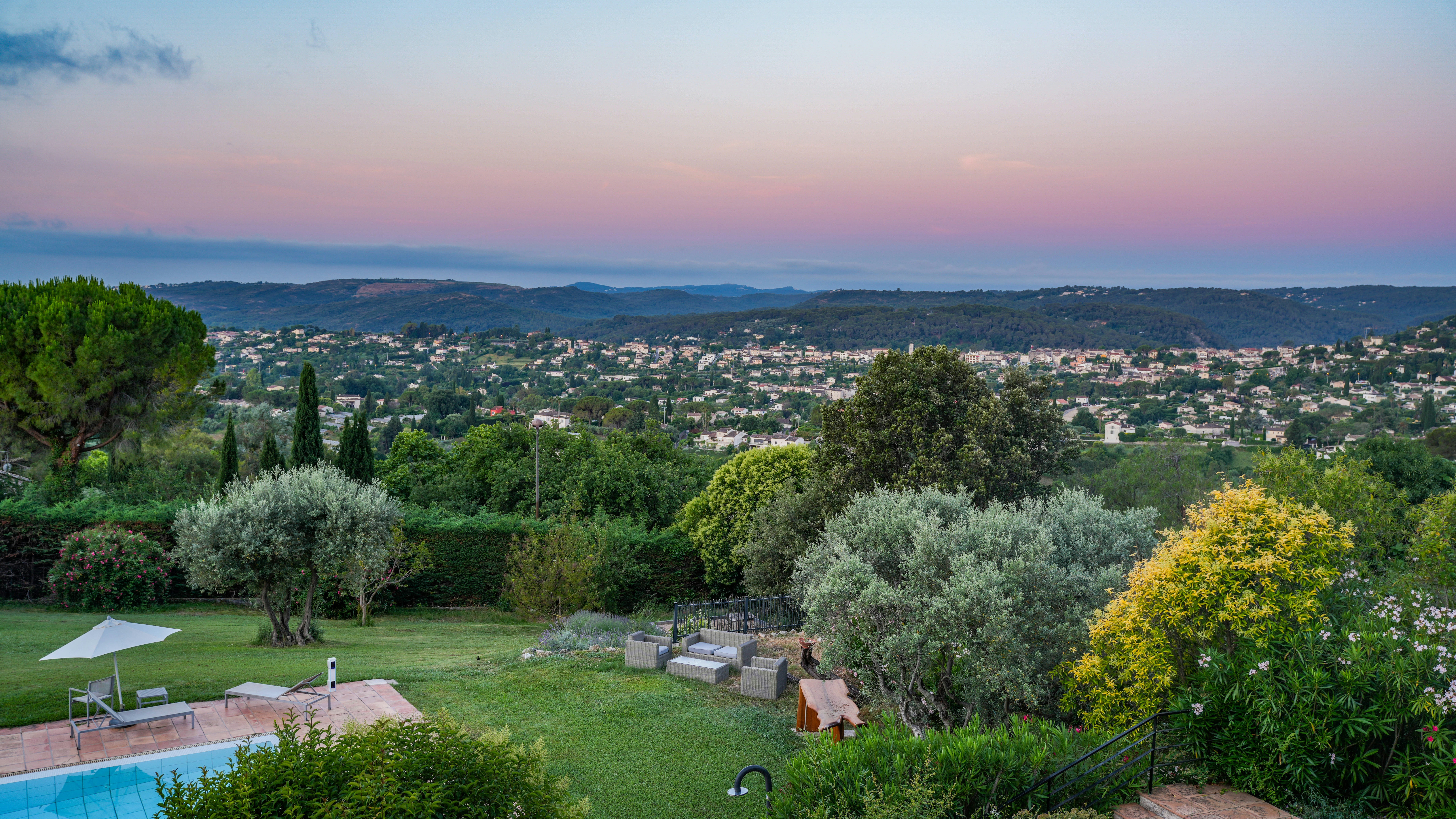 Horizon Above the Hills: Terrace Garden Framing a Quiet Valley