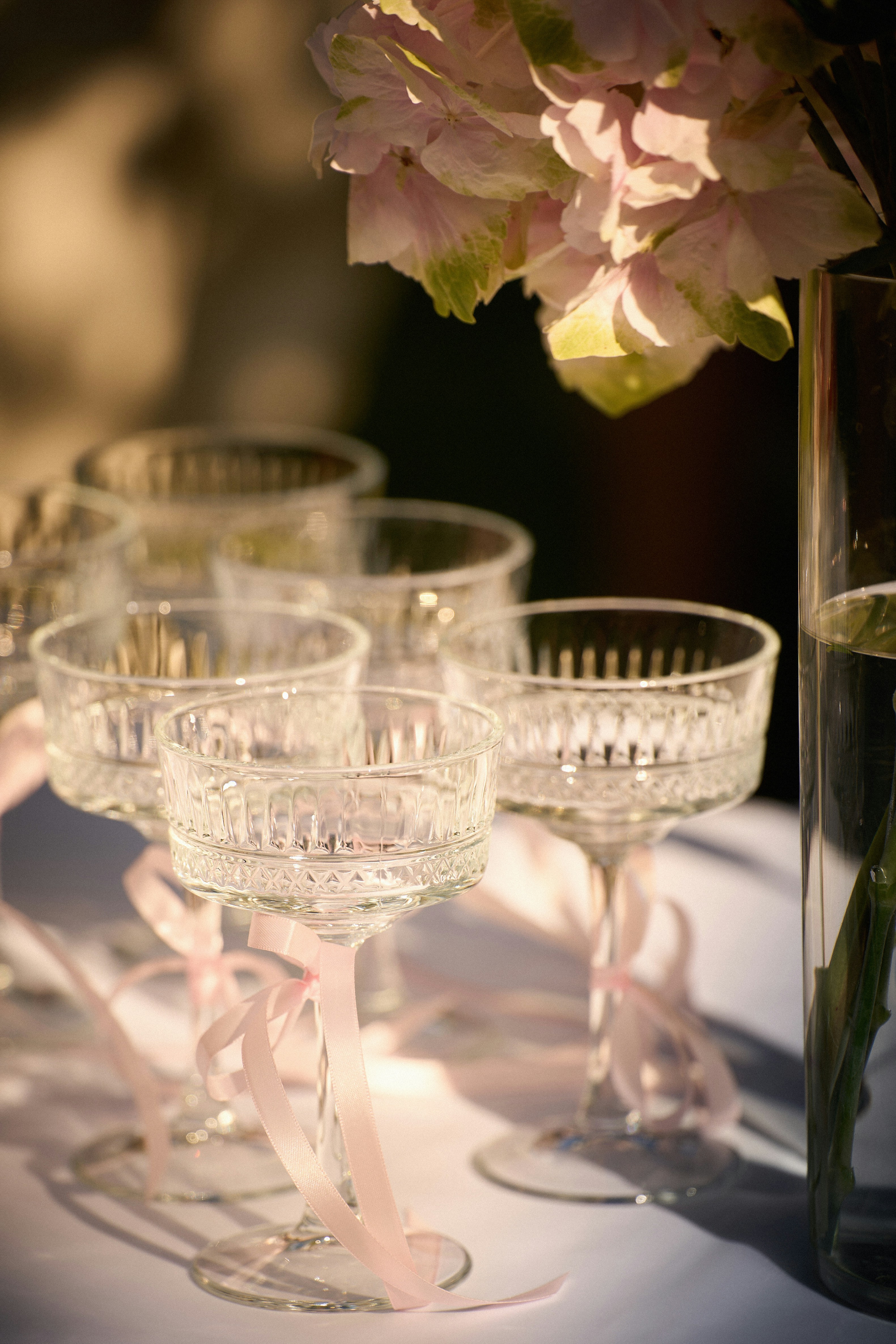Glassy Celebrations: Crystal Rims and Ribbon-Soft Light
