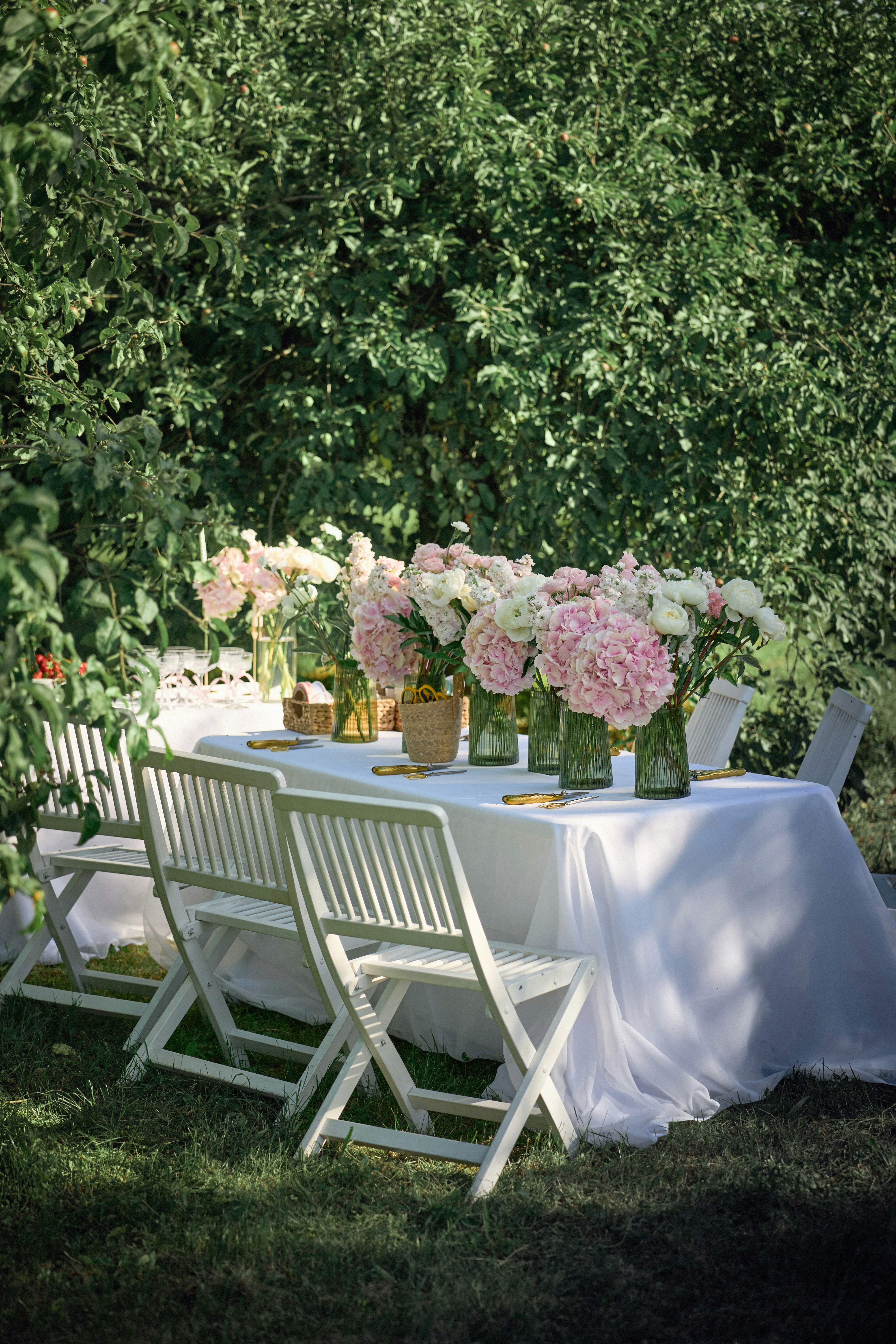 Petal-Spread Garden Bridal Table set beneath a Shaded Canopy